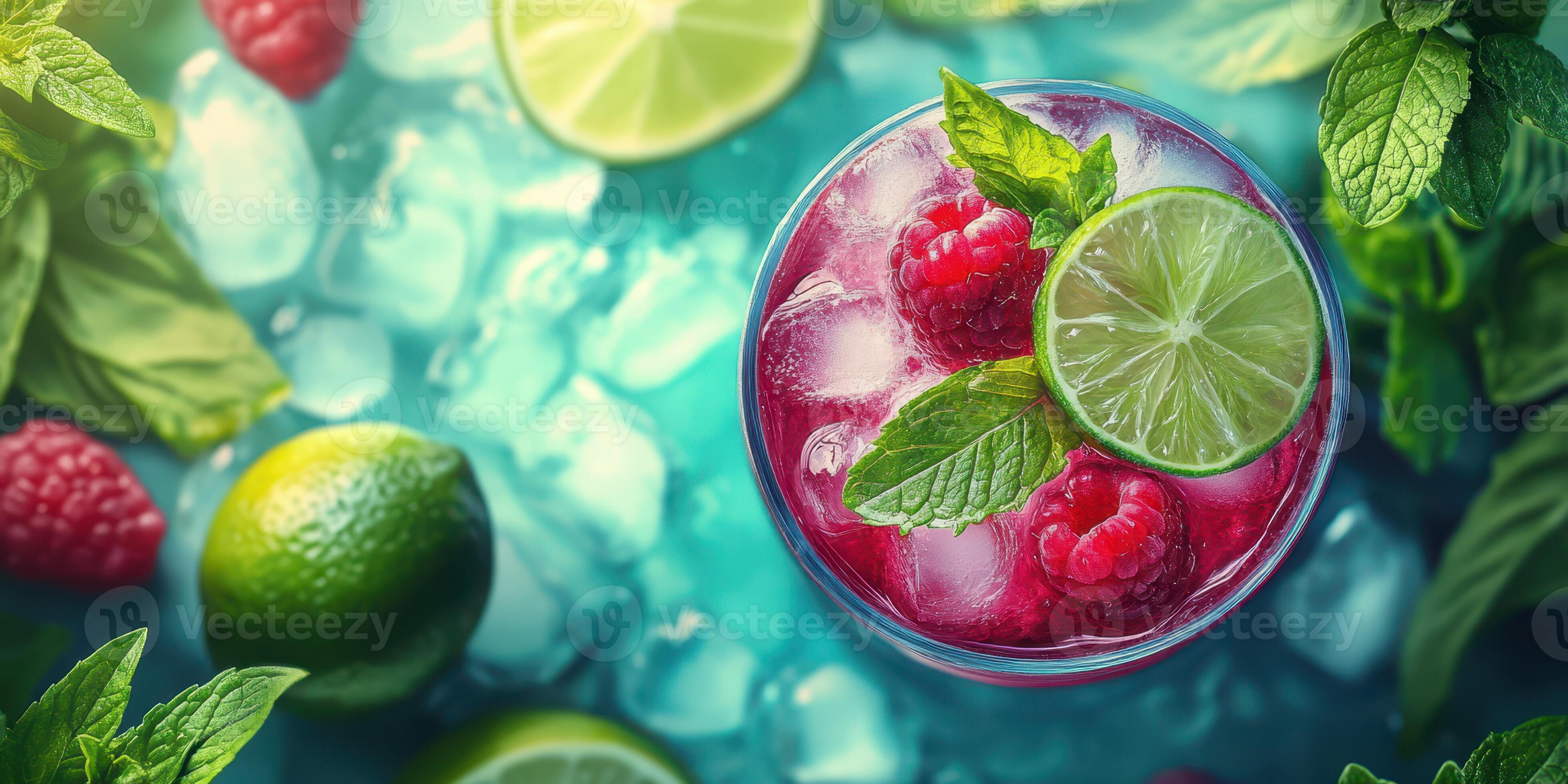 Refreshing raspberry mint cocktail with lime and ice on a vibrant blue background 56354936 Stock ...