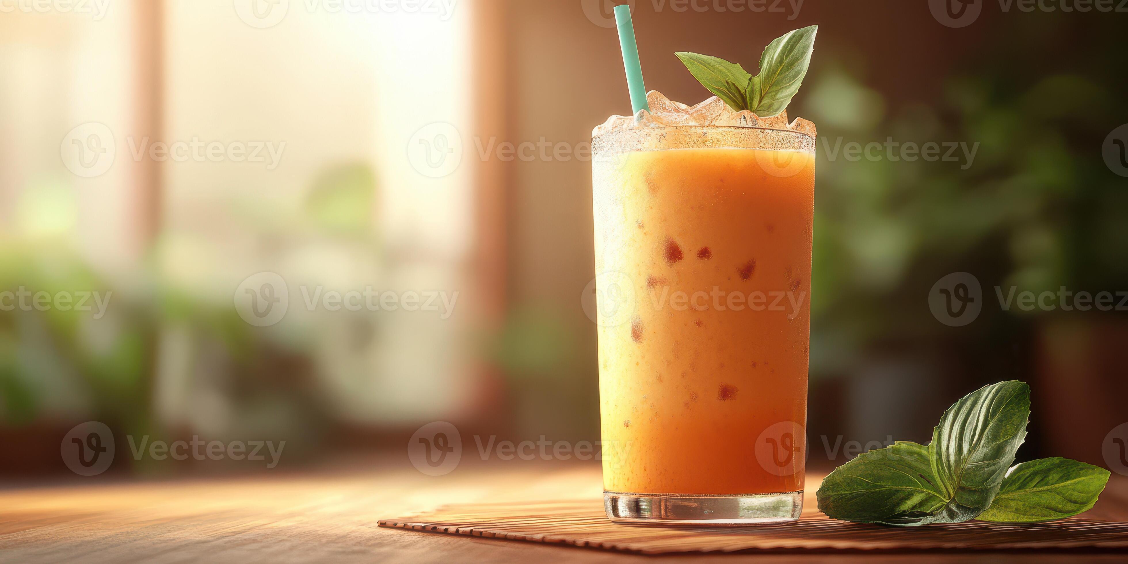 Refreshing iced beverage with mint leaves on a wooden table in a sunlit cafe setting 56357759 ...