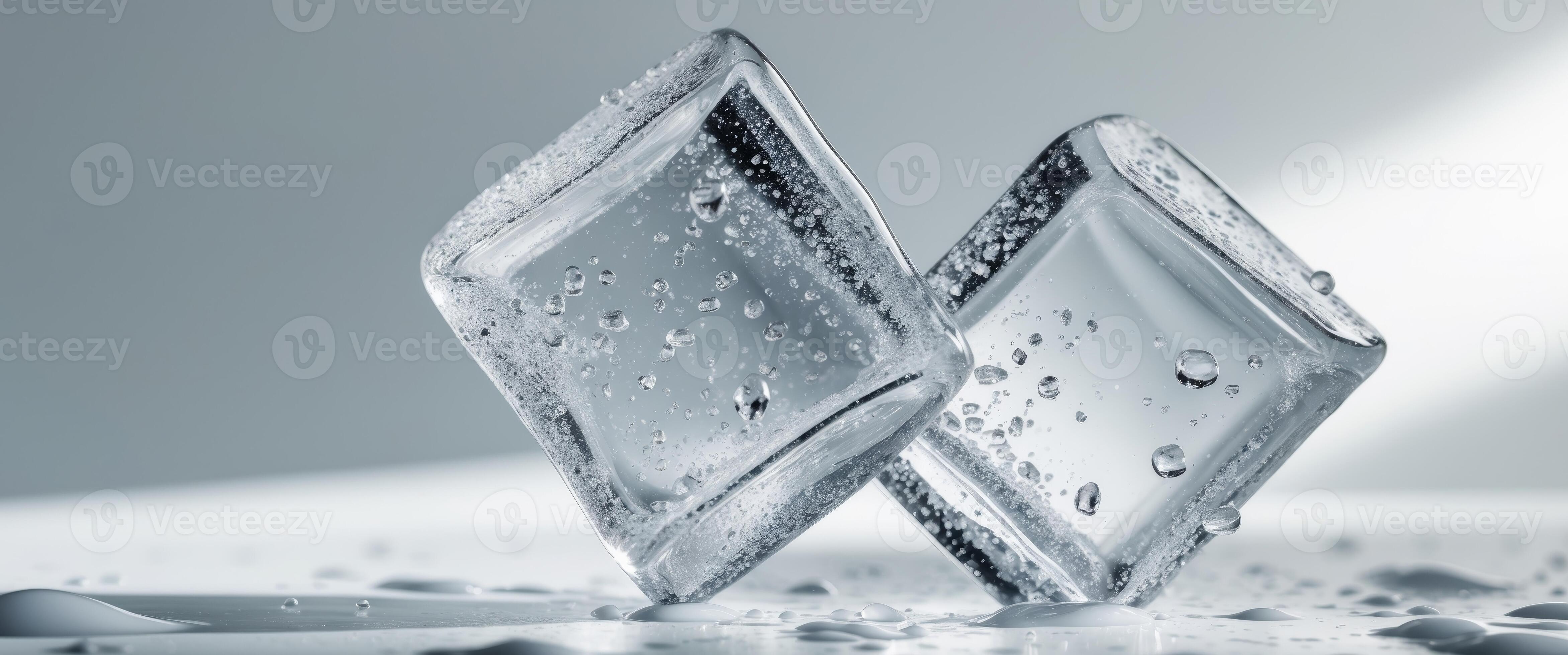 Two Illuminated Ice Cubes Glistening With Water Droplets. 56395645 Stock Photo at Vecteezy