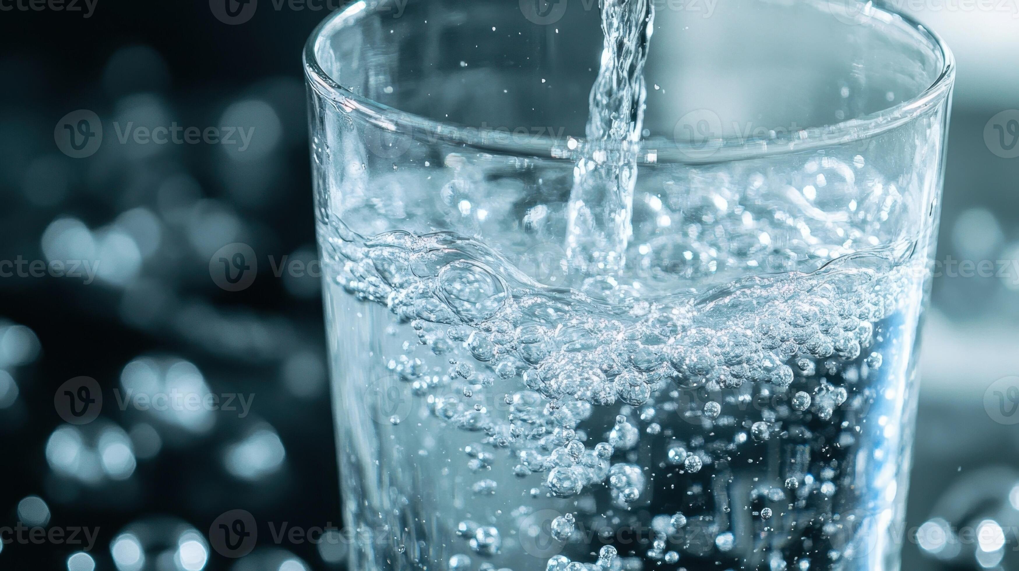 Pouring sparkling water into glass with bubbles on dark background 56426398 Stock Photo at Vecteezy