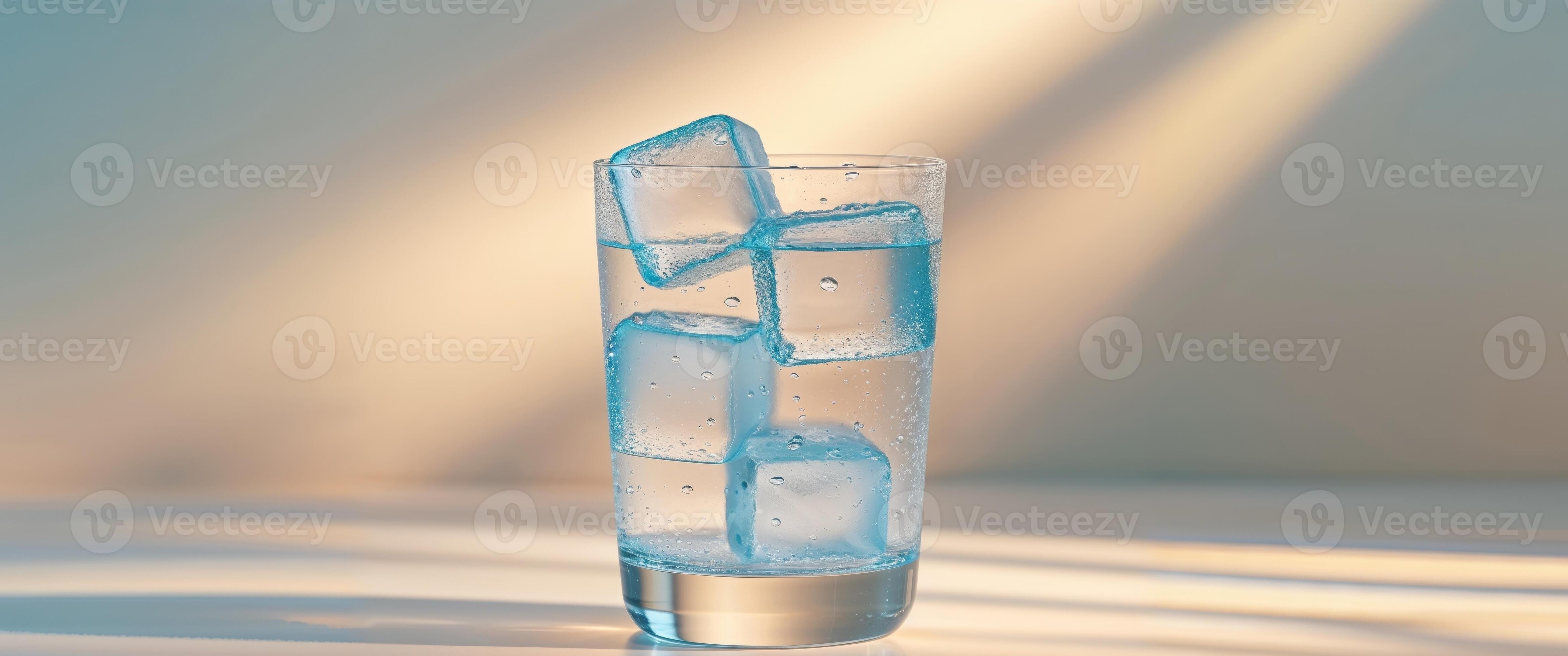 Refreshing Drink with Ice Cubes in a Sunlit Setting. 56792923 Stock Photo at Vecteezy