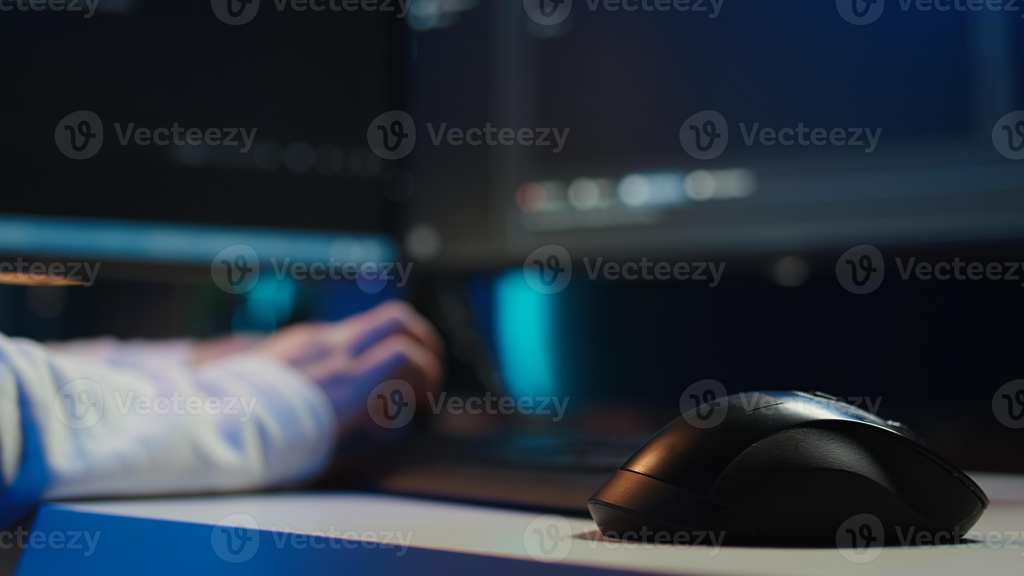 Programmer typing on computer to fix vulnerabilities in software enabling attackers to ...