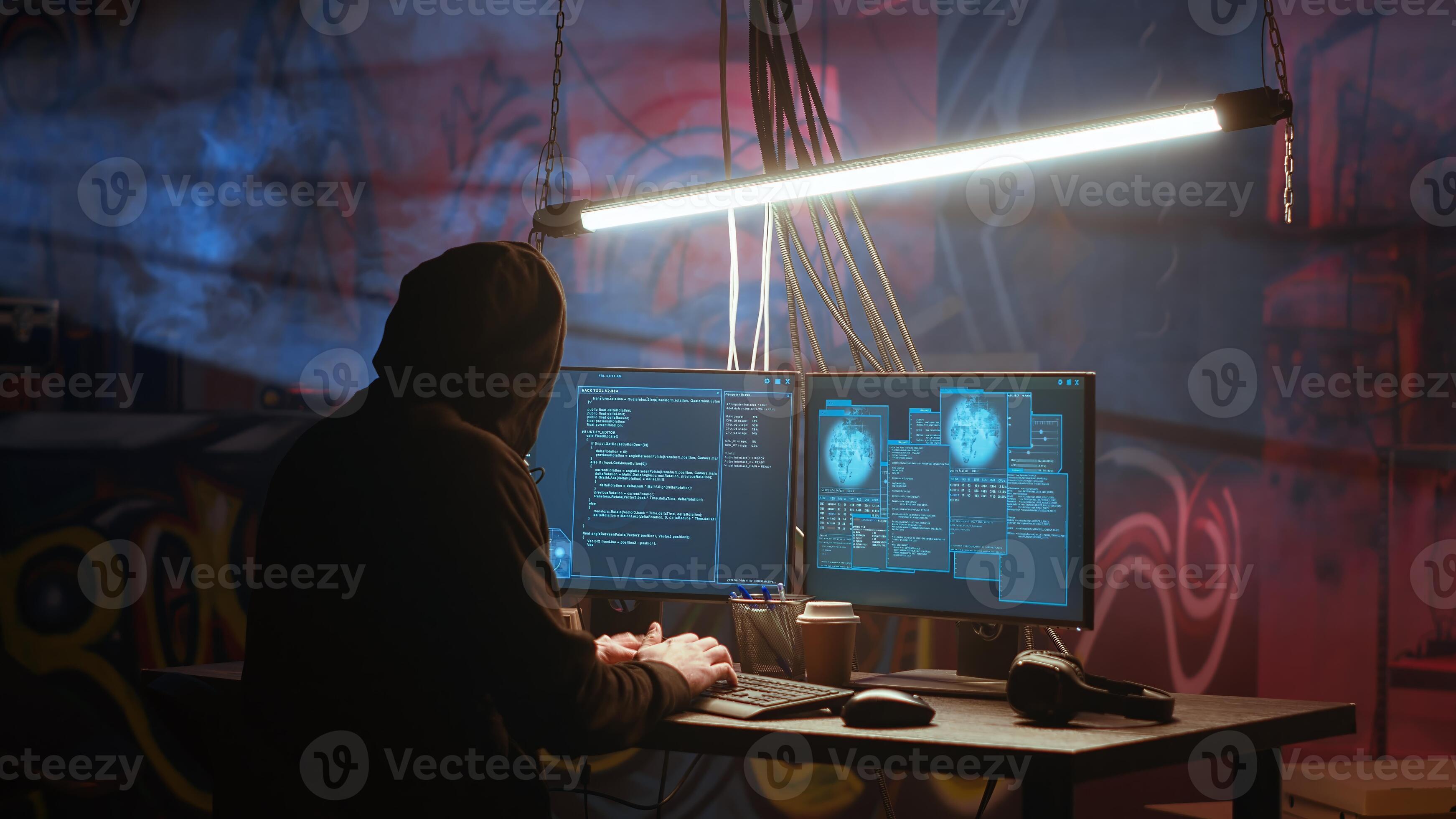 Hacker arrives in messy base of operations with neon lights and graffiti drawings sprayed on ...