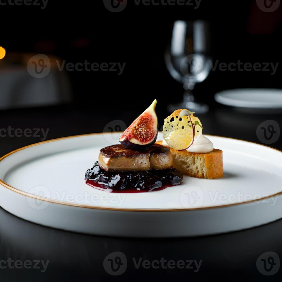 Luxury foie gras dish with caramelized figs toasted brioche berry sauce fine dining in black ...