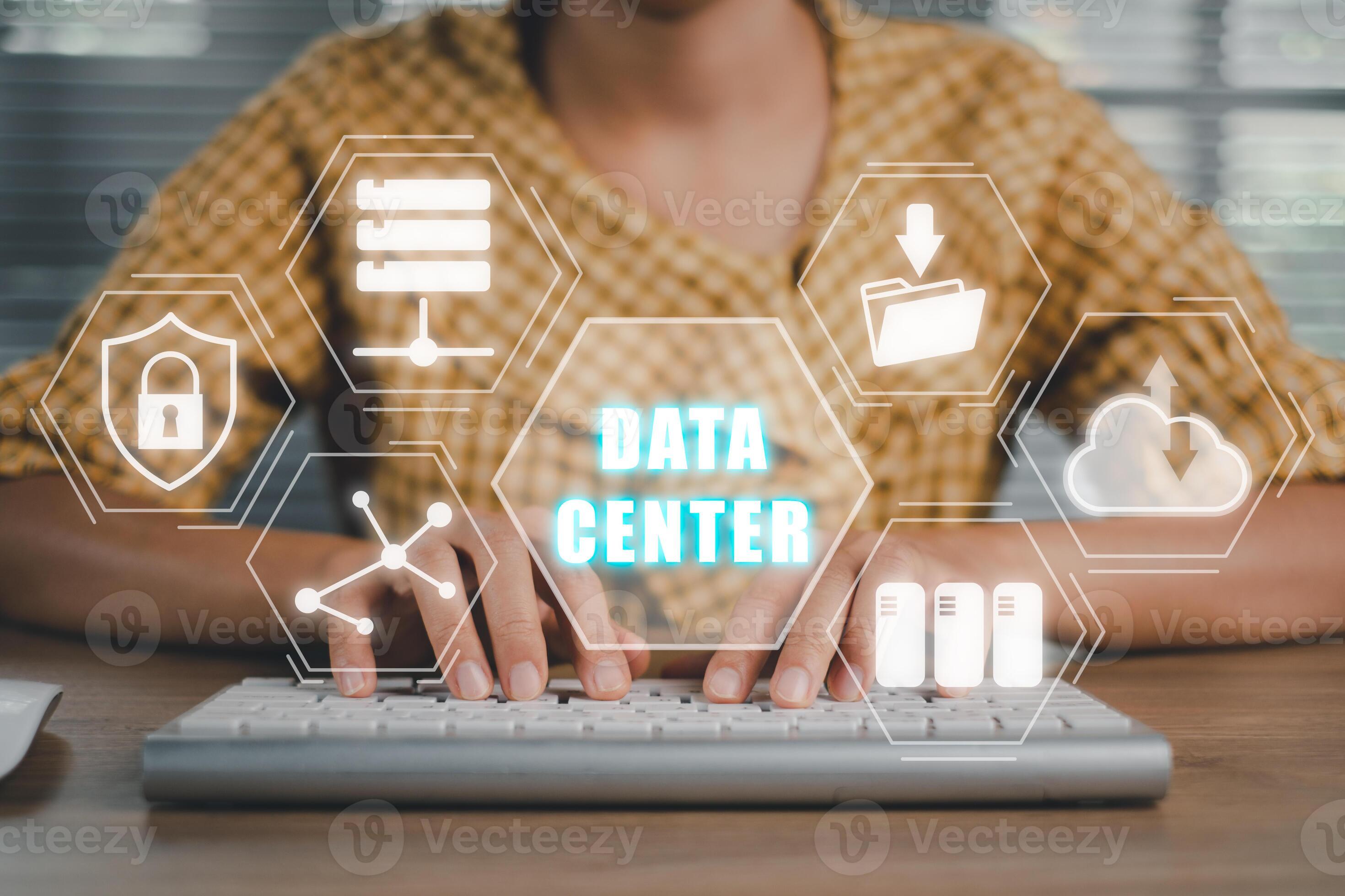 Data Center concept, Person hand typing on keyboard computer with data center icon on virtual ...