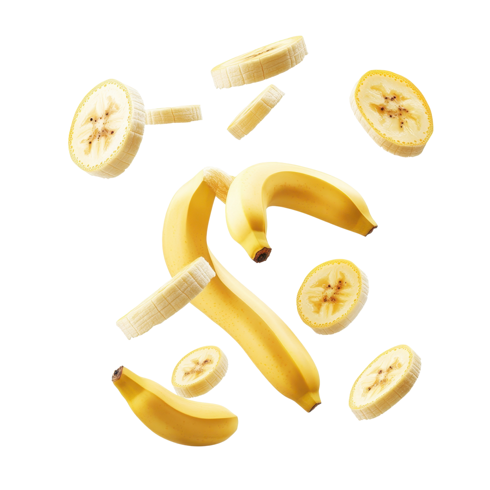 Falling banana slices and whole bananas isolated on a white background creating a vibrant ...