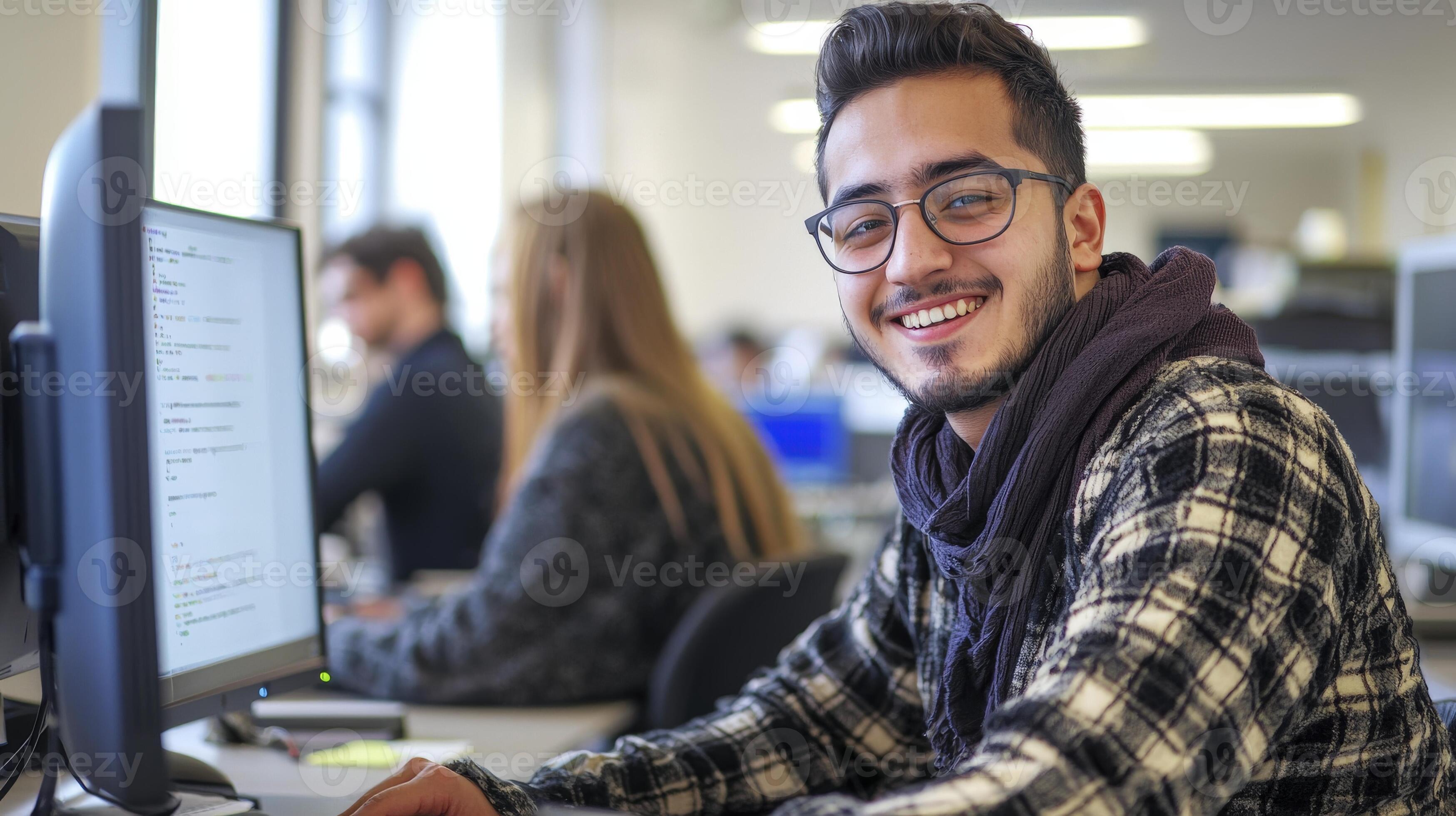 Happy programmer smiling at computer screen 58193864 Stock Photo at ...