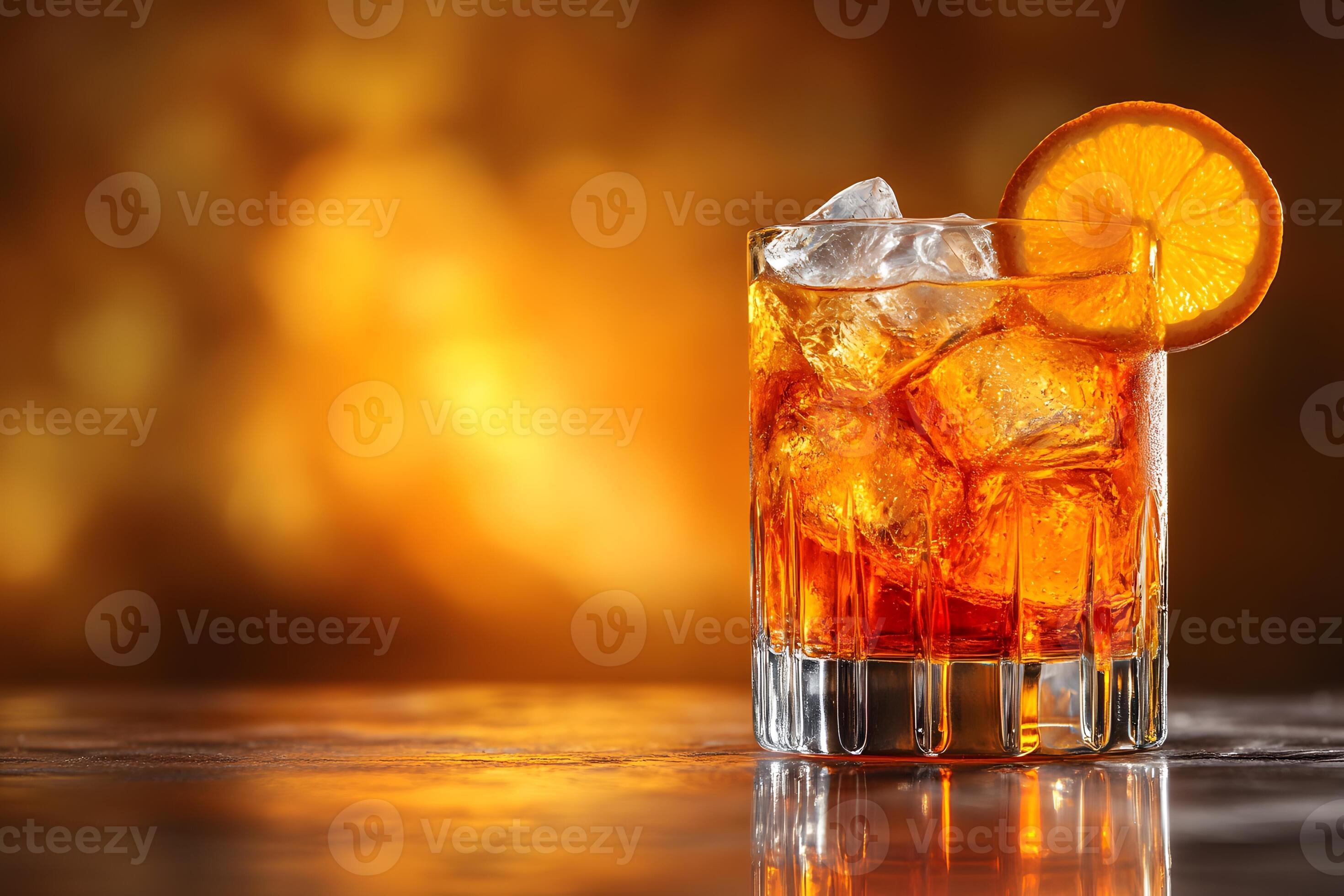 Refreshing Orange Cocktail with Ice Cubes Against Warm Bokeh Background for Beverage Design ...