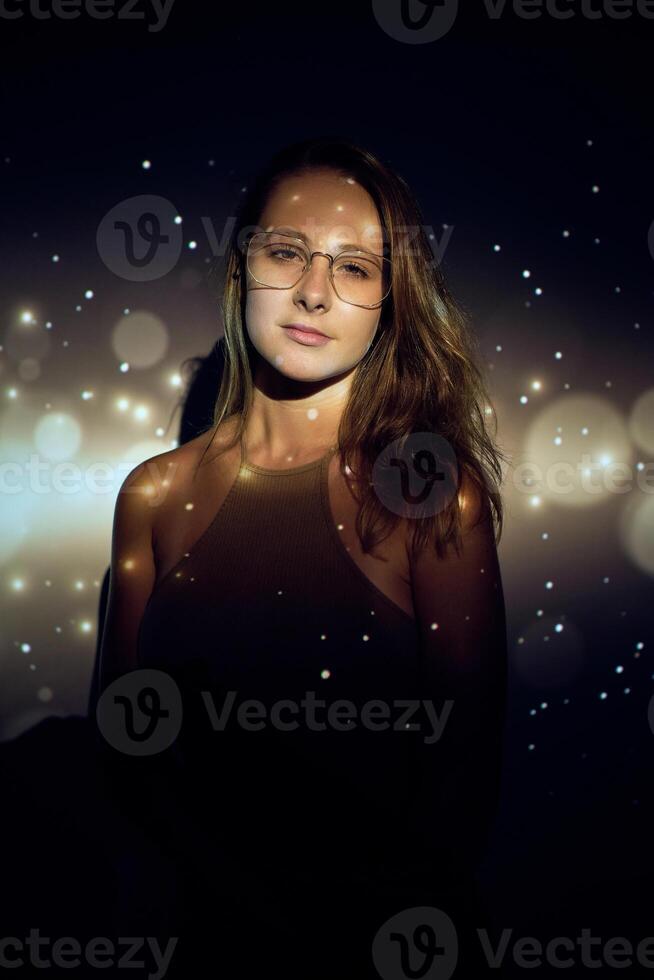 Indifferent woman under sparks projection 58546765 Stock Photo at Vecteezy