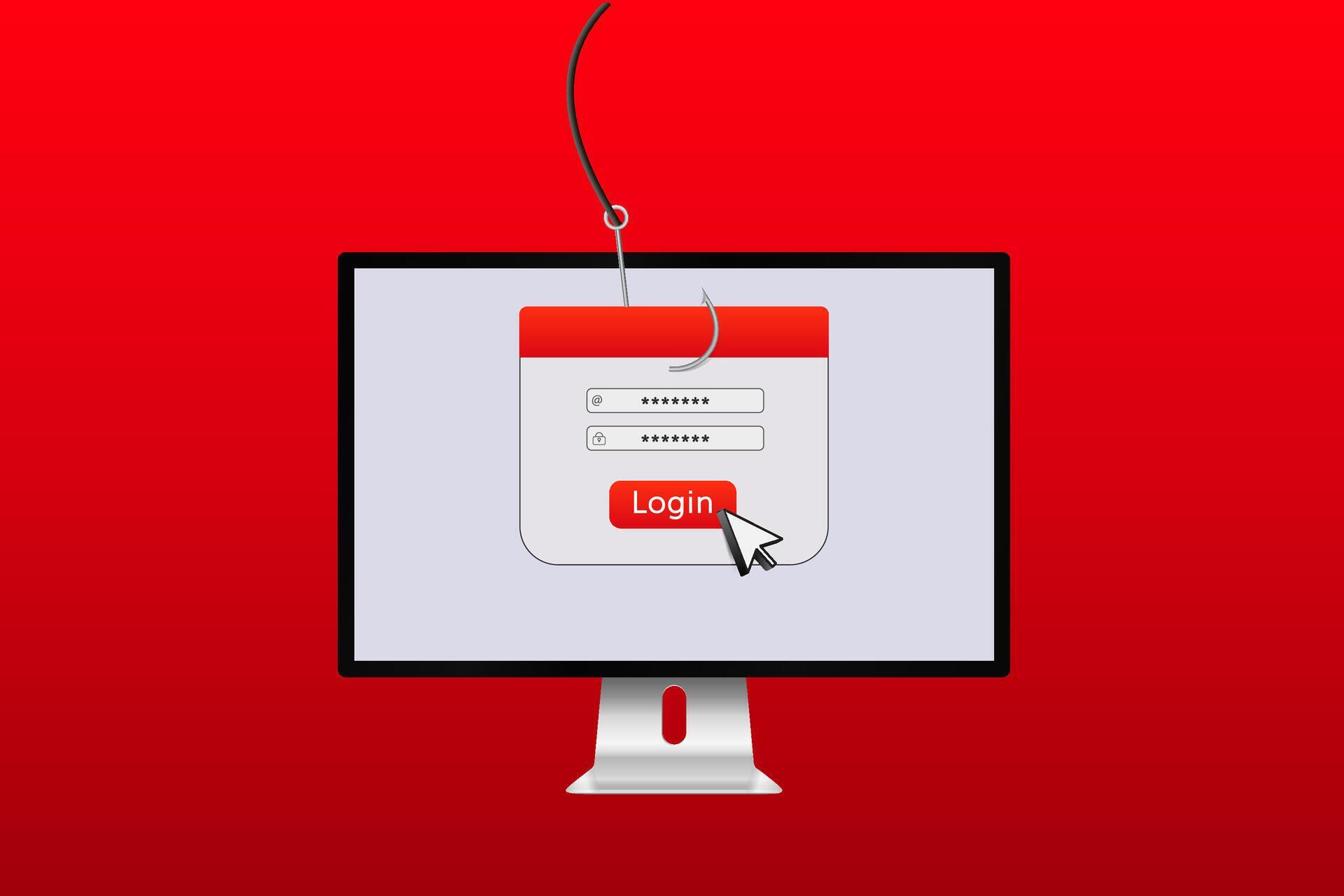 Computer screen displaying phishing scam alert with suspicious login page and password form ...
