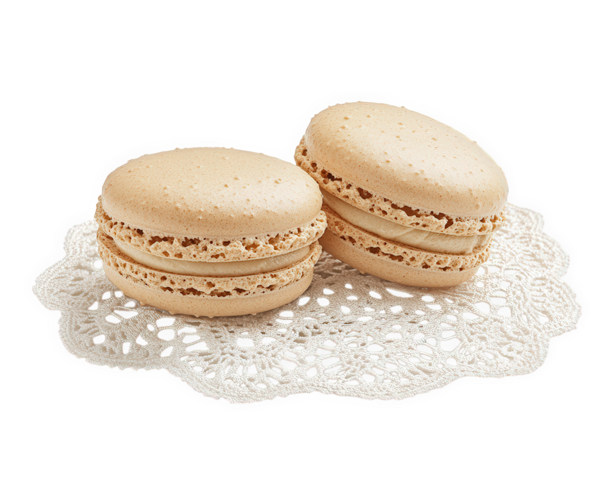 Two macarons on a doily on a white table 59040820 PNG