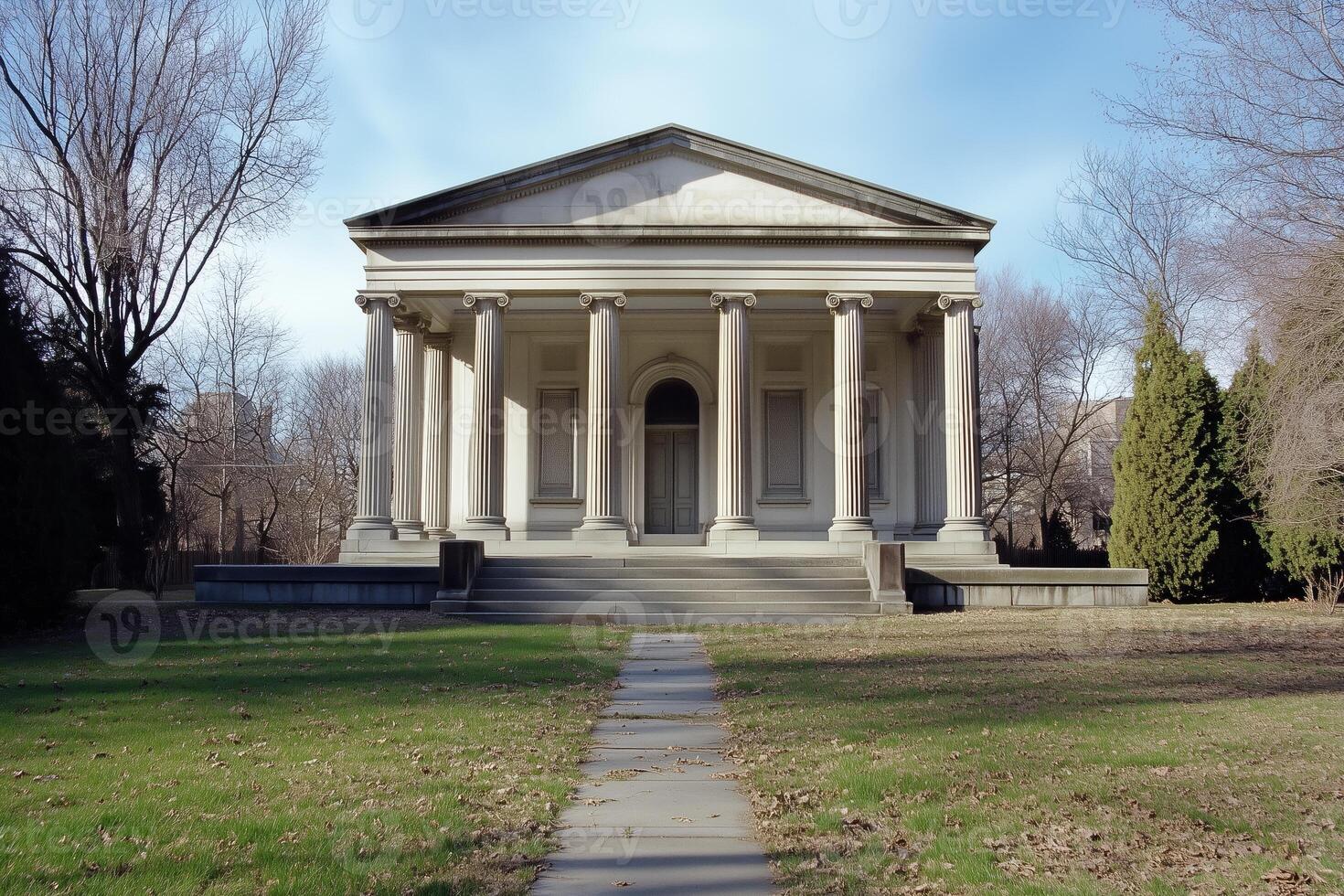A neoclassical Greek Revival style building with tall columns and a triangular pediment ...