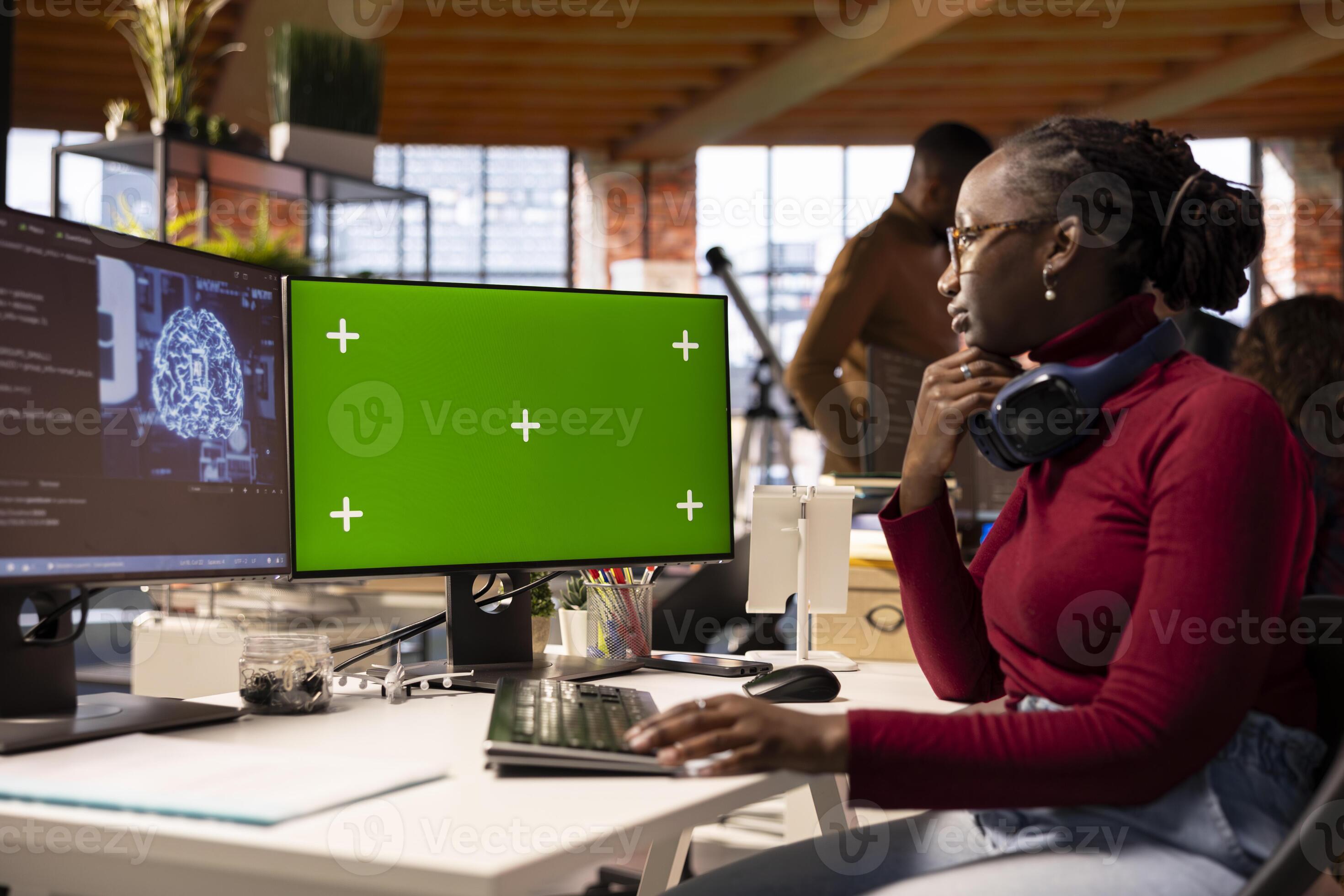 Engineer Using Chroma Key Computer To Do Maintenance On Artificial