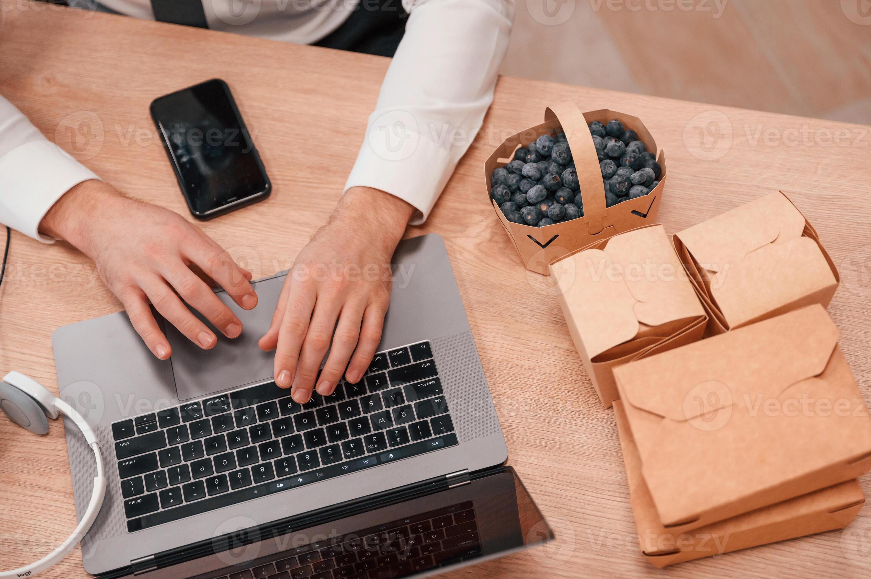 Typing On Keybord Top View Of Hands Of The Man That Is Working By Using Laptop Eco Boxes