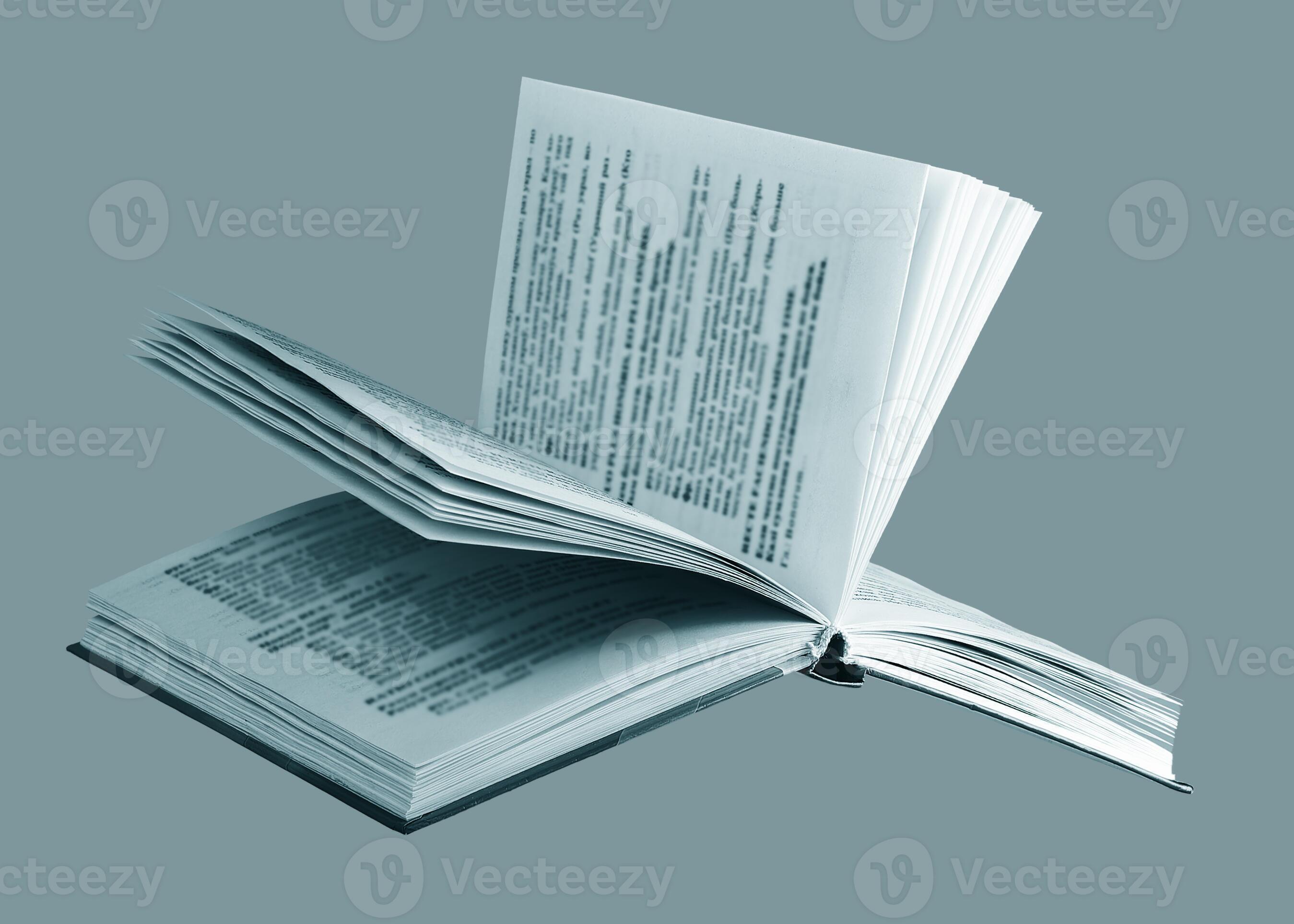 Open book, pages flipping at a tilted angle, on blue monochrome ...