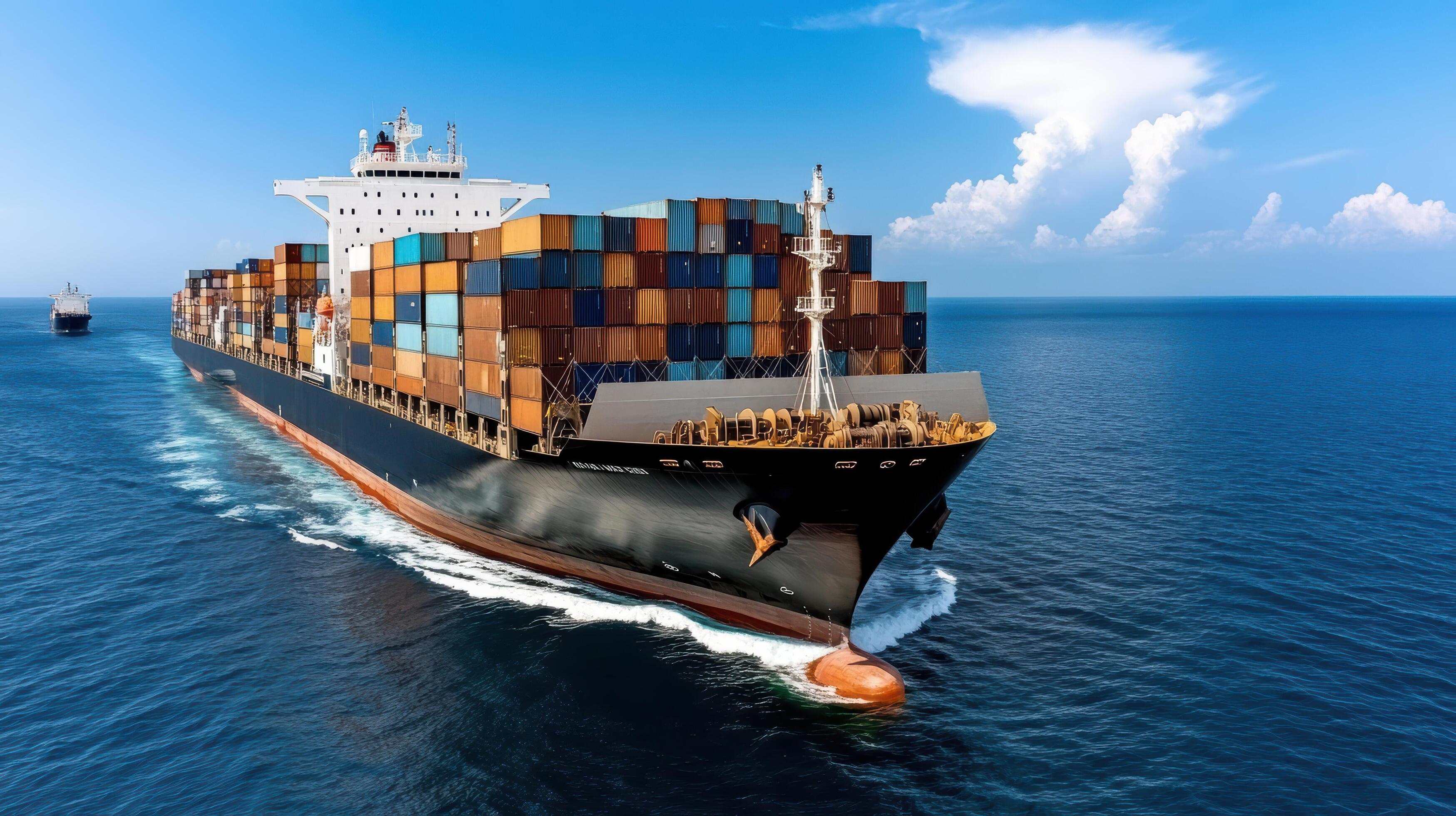 large cargo ship loaded with colorful containers sails through calm waters, showcasing maritime ...