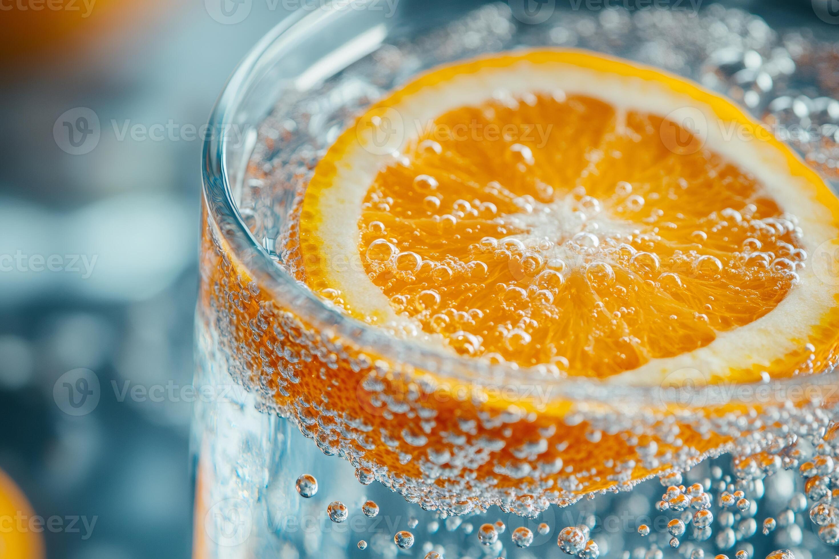 Refreshing orange slice submerged in sparkling water with bubbles 59583381 Stock Photo at Vecteezy