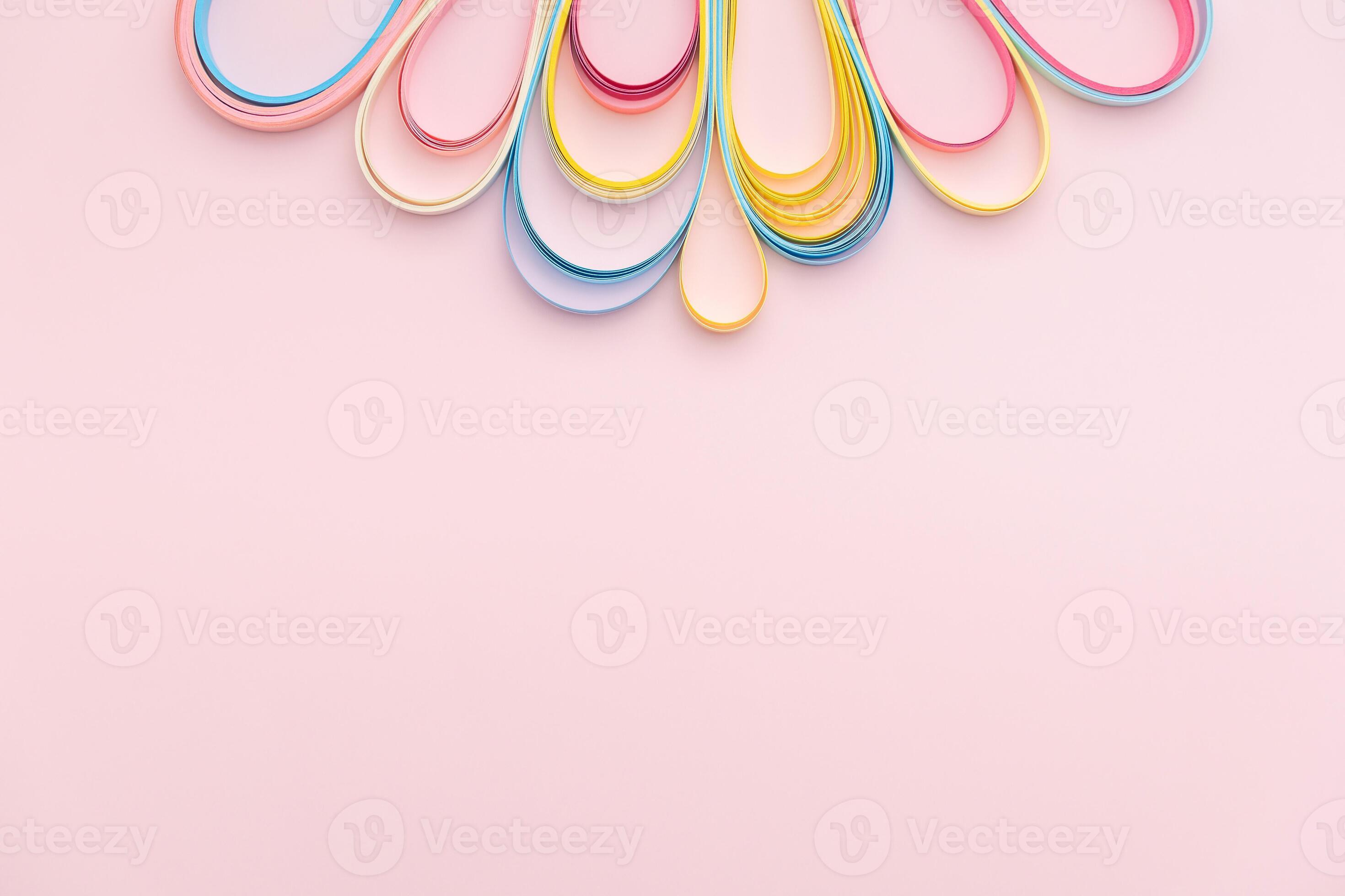 Paper strip curls on pink background 59904175 Stock Photo at Vecteezy