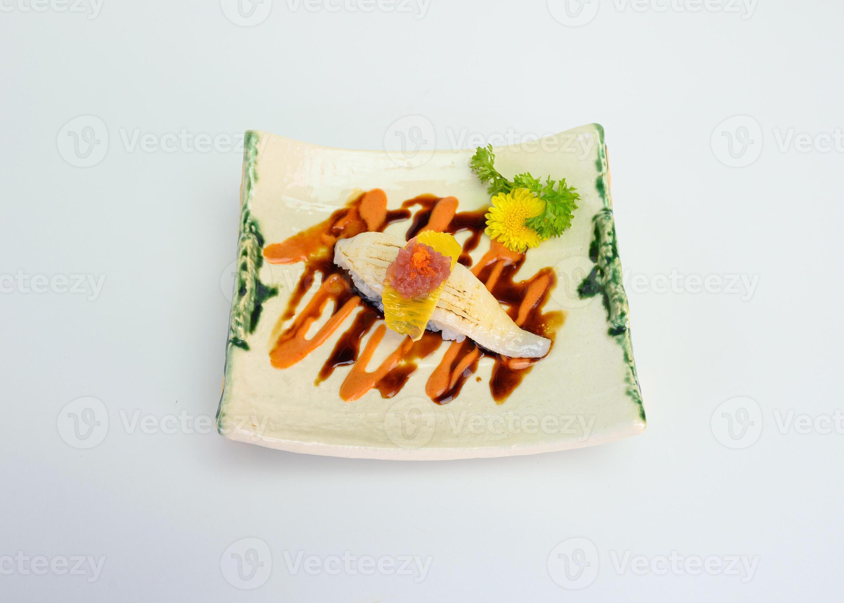 Smoked Engawa red wine sauce sushi 61227224 Stock Photo at Vecteezy