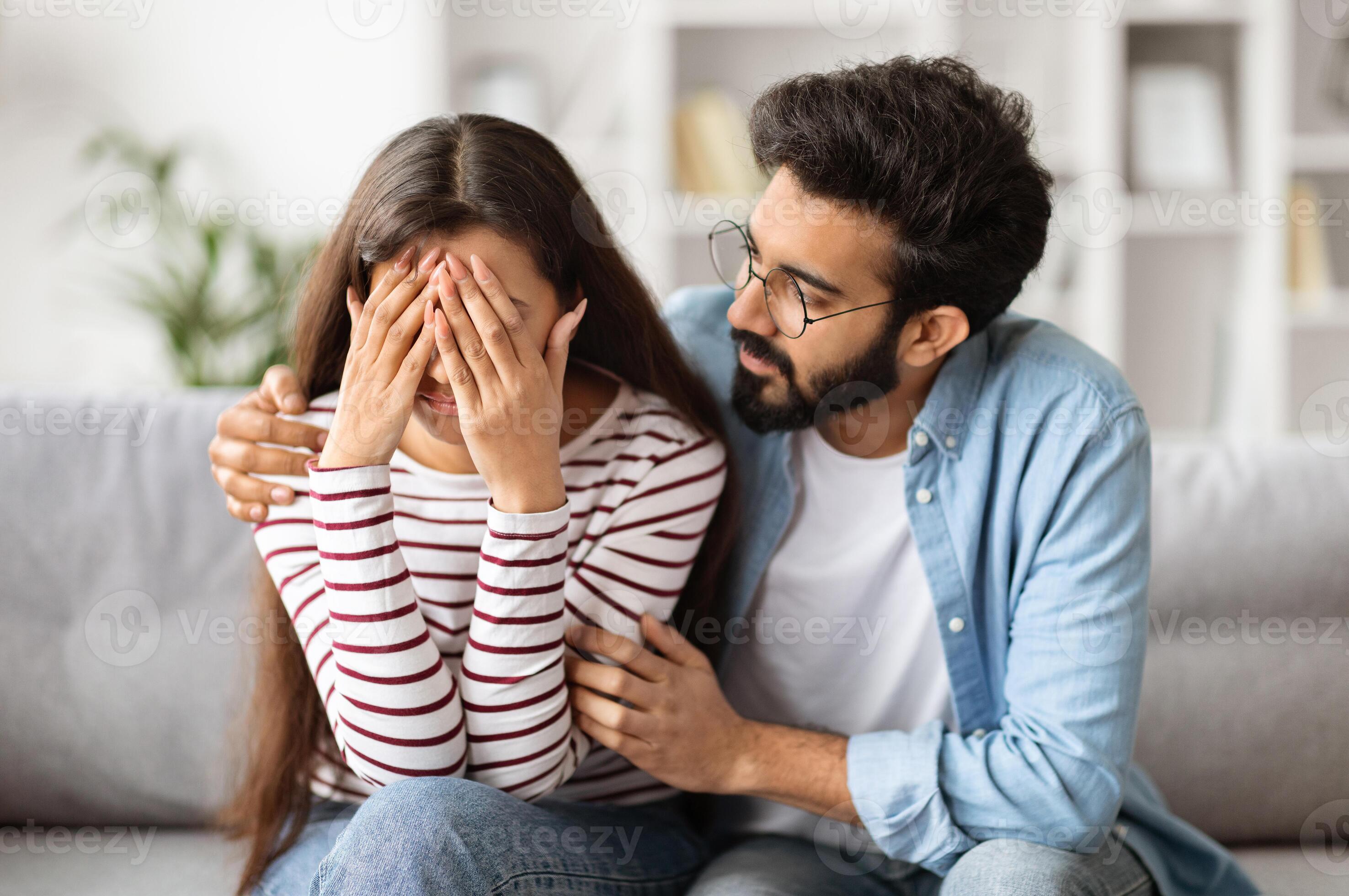 Loving husband indian man comforting consoling upset crying wife woman ...