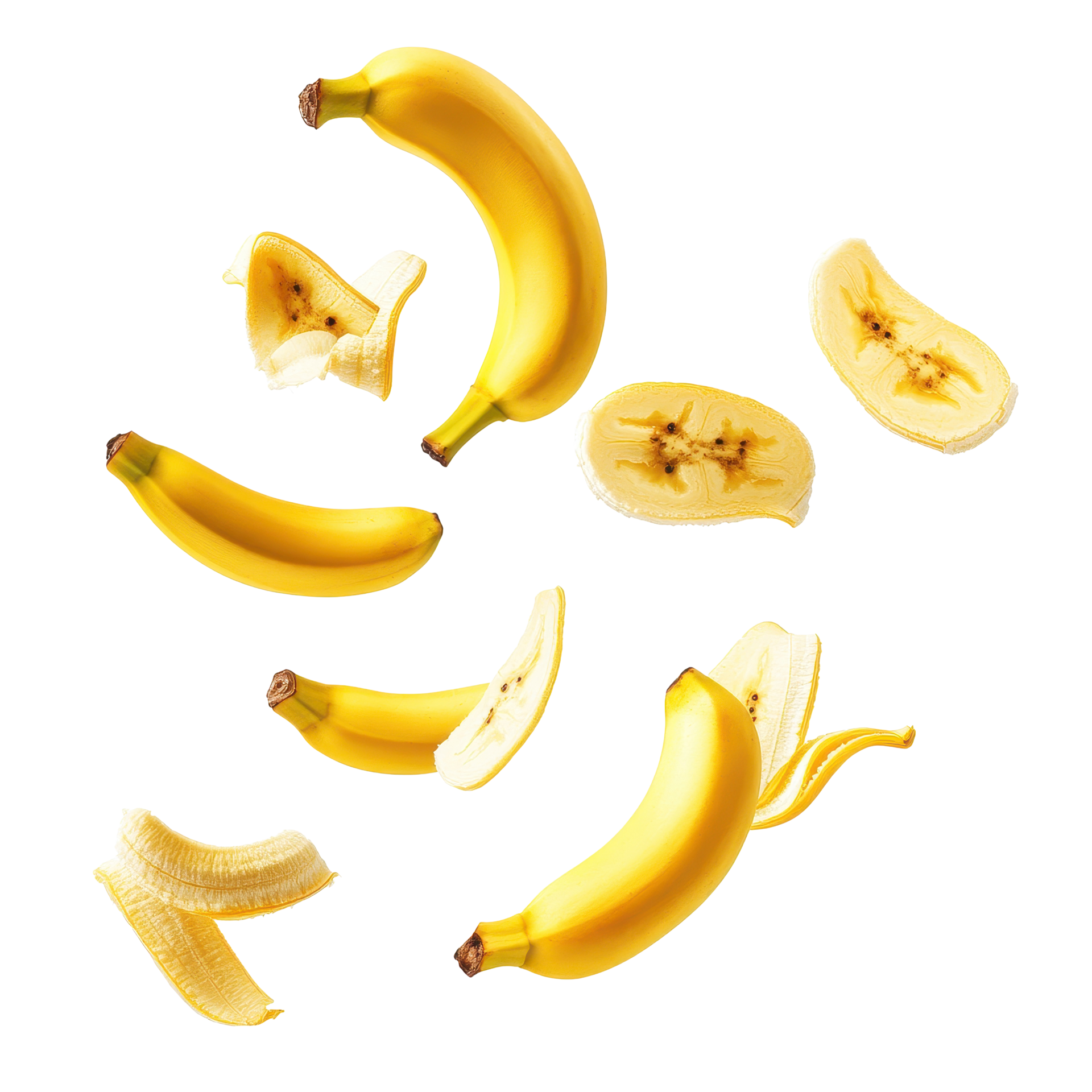Falling slices of banana create a playful display against a bright white background, Falling ...