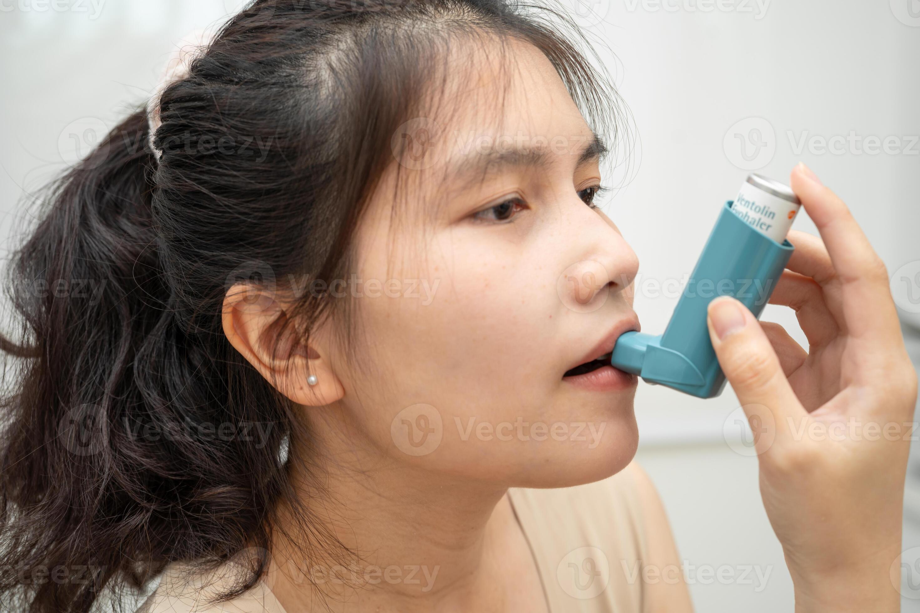 woman use Asthma and chronic obstructive pulmonary disease COPD, Asian young man using metered ...
