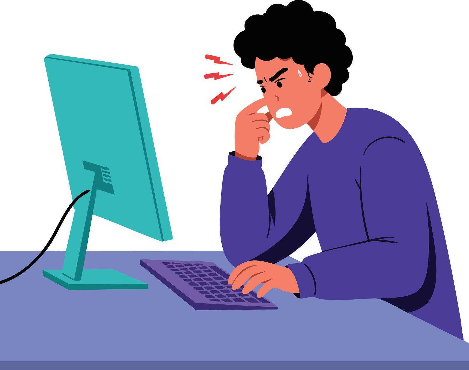 Frustrated young man working on computer with angry expression and ...