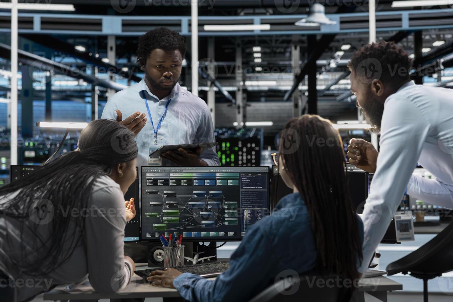 Data center system administrators using PC to visualize artificial intelligence neural networks ...