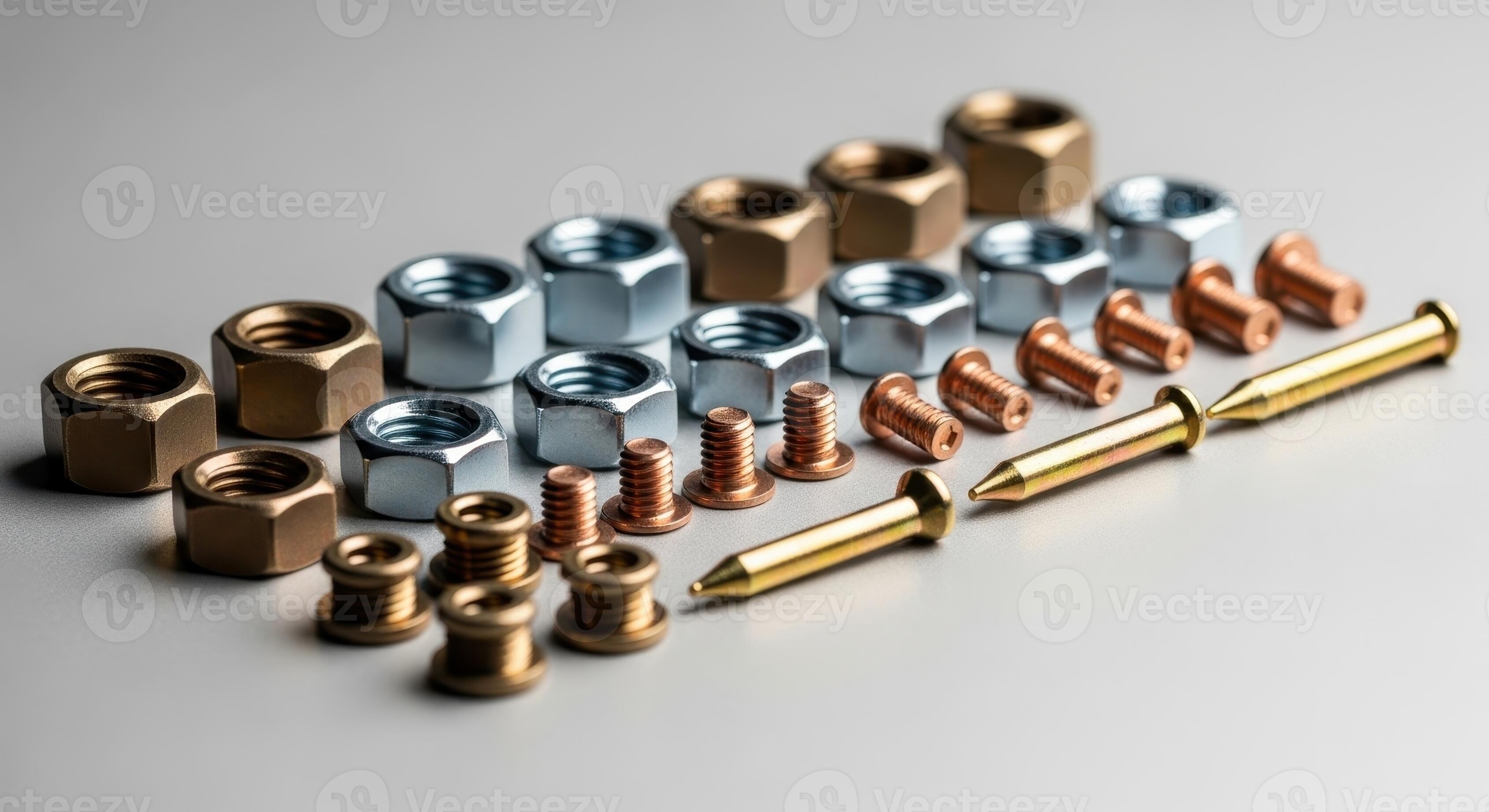 Assorted metal fasteners including brass and steel nuts, copper screws, and brass pins 67243285 ...