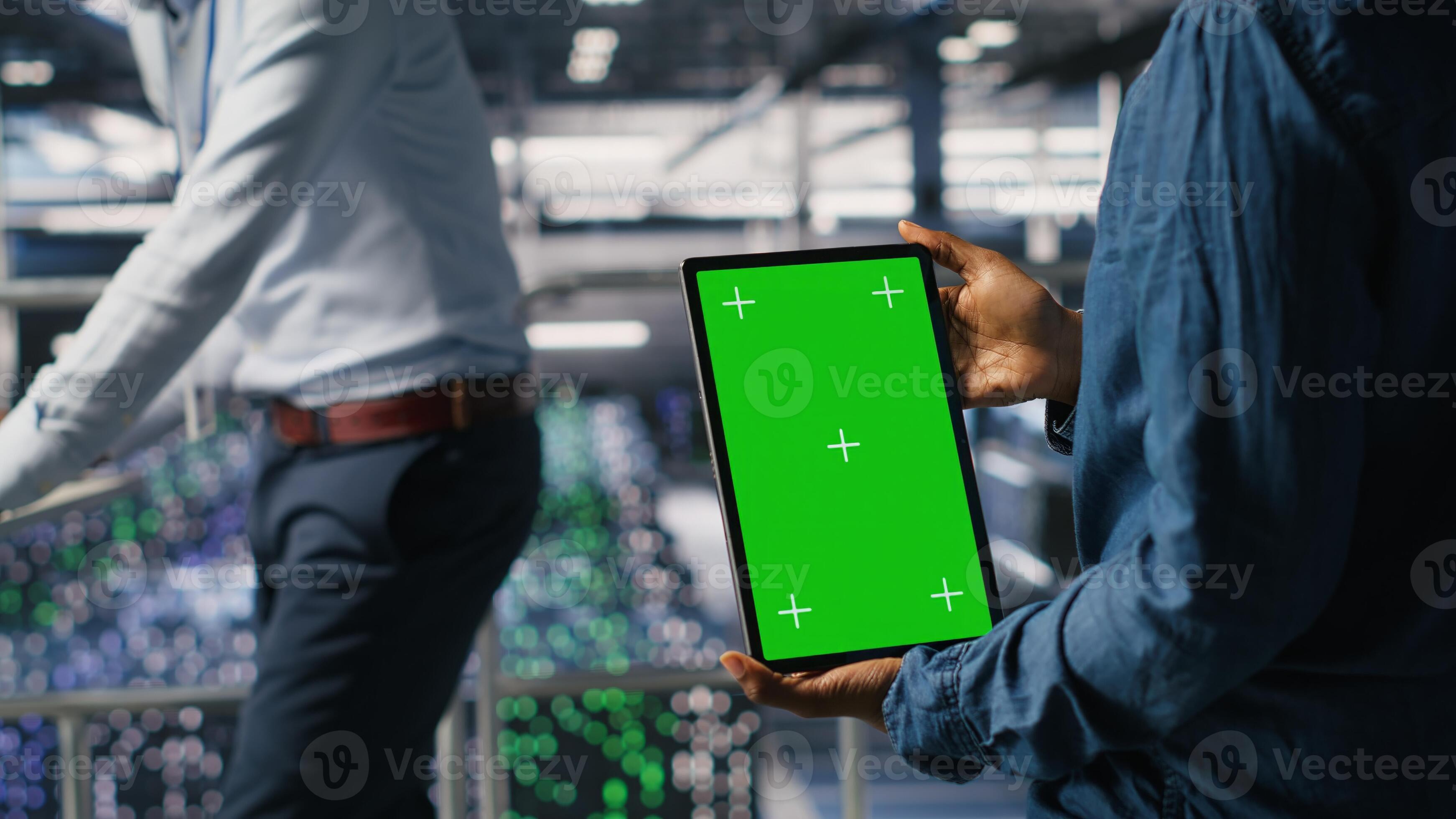 Data Center Engineers Monitoring Neural Network Llm Visualization Using Green Screen Tablet