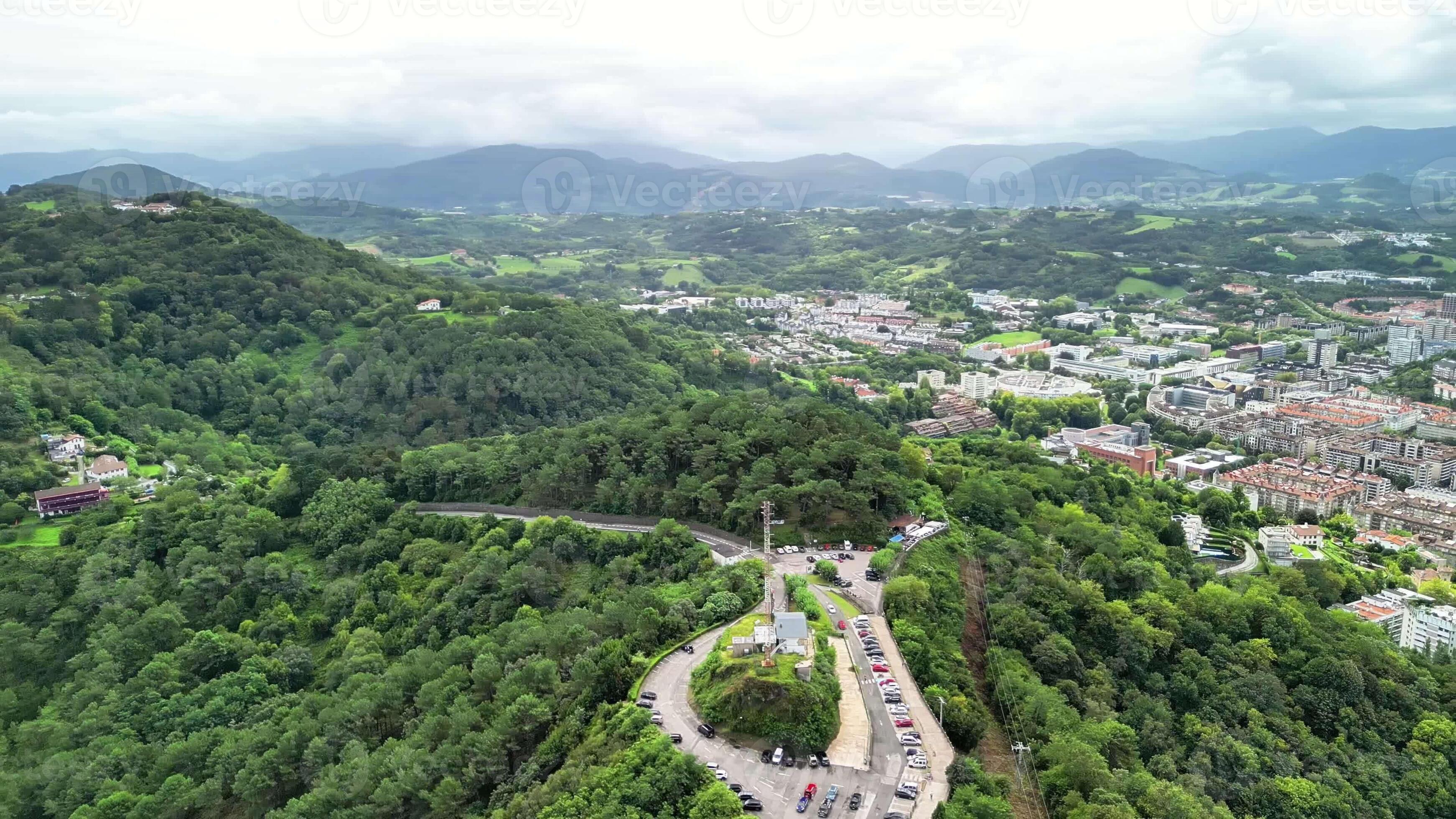 This stunning aerial shot beautifully showcases a vibrant city nestled ...