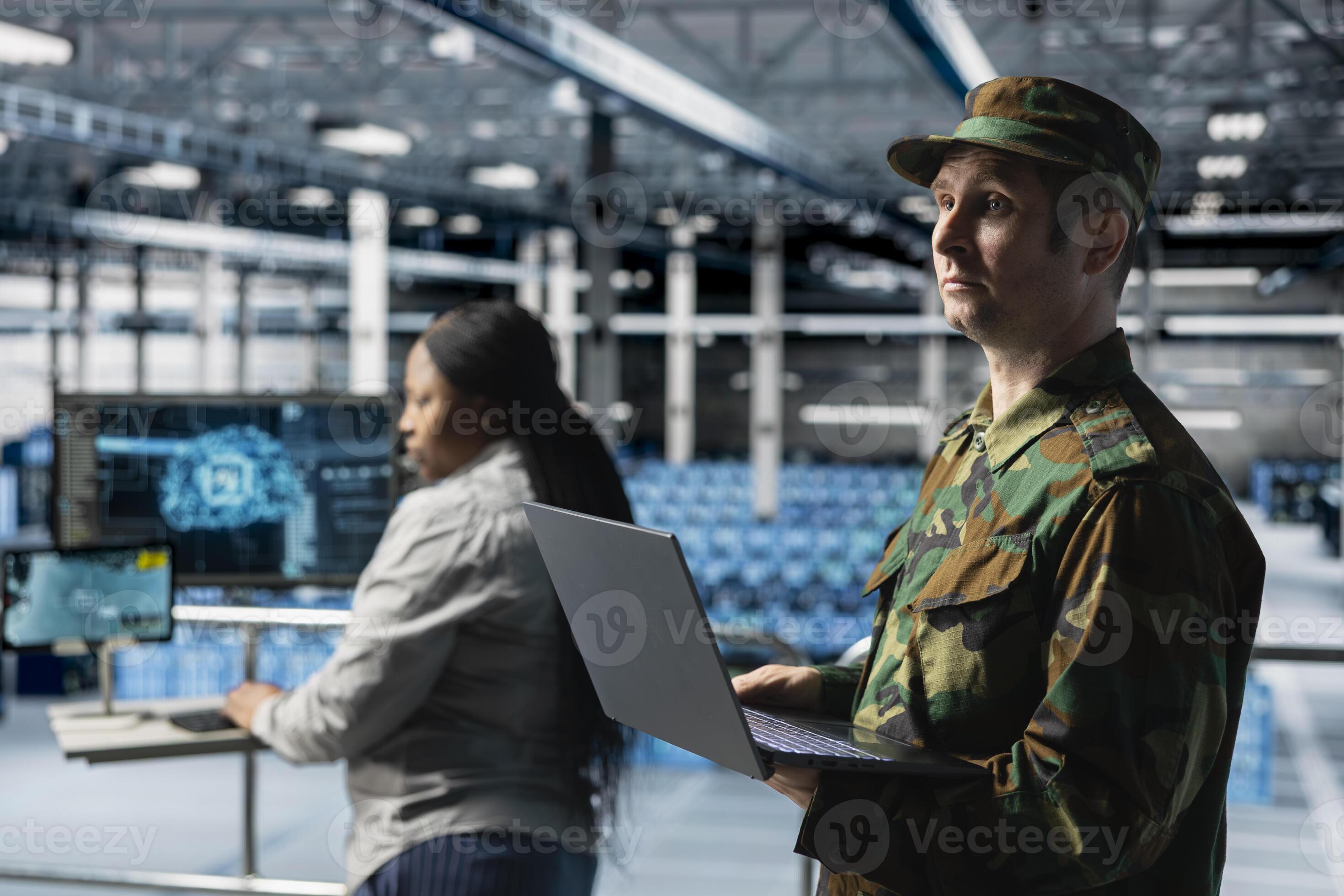 Data center army specialists configuring rigs to support AI integration in military ...