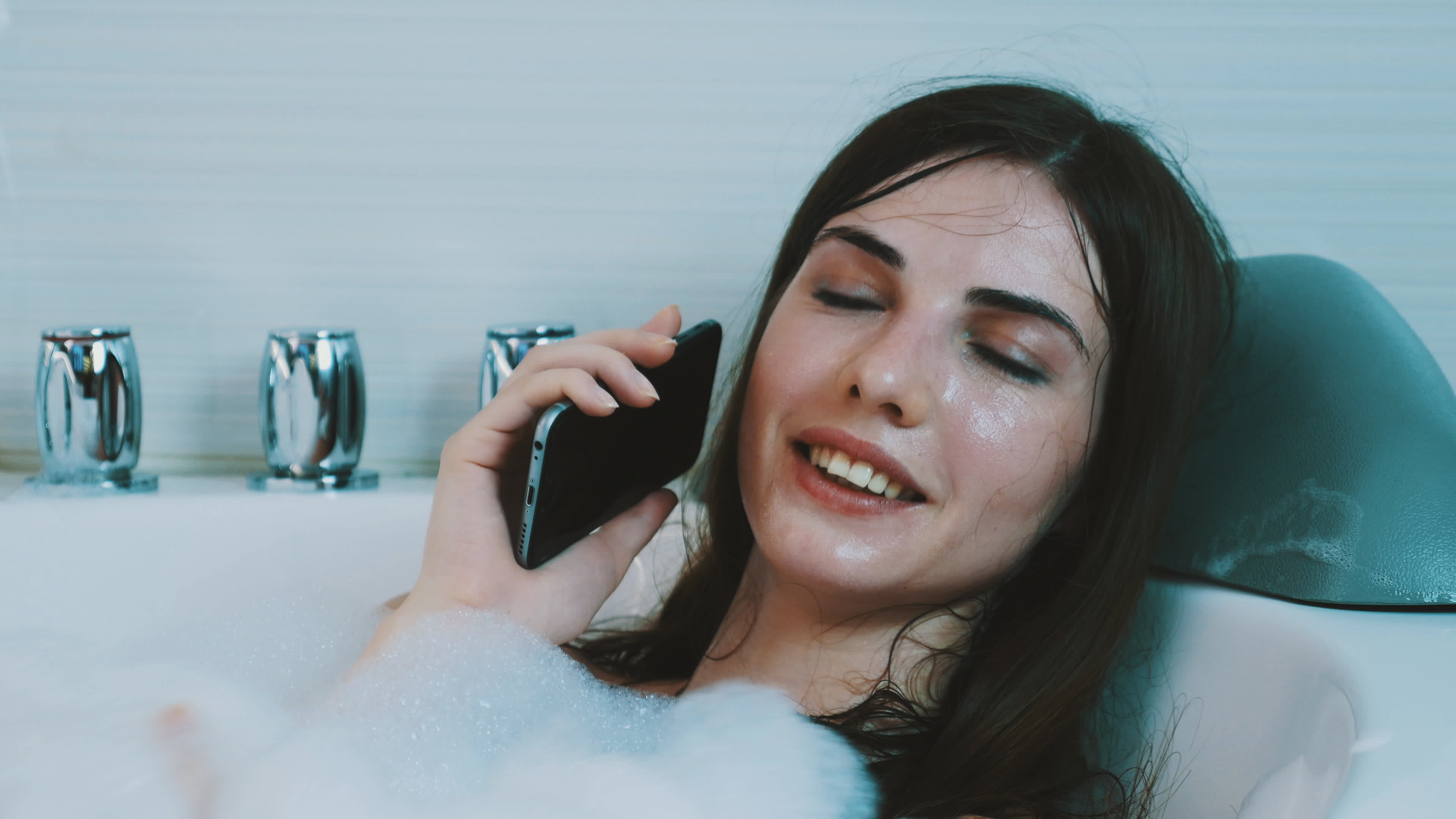 Brunette Girl Taking Bath Full Of Foam Speaking On Phone Relax Laugh