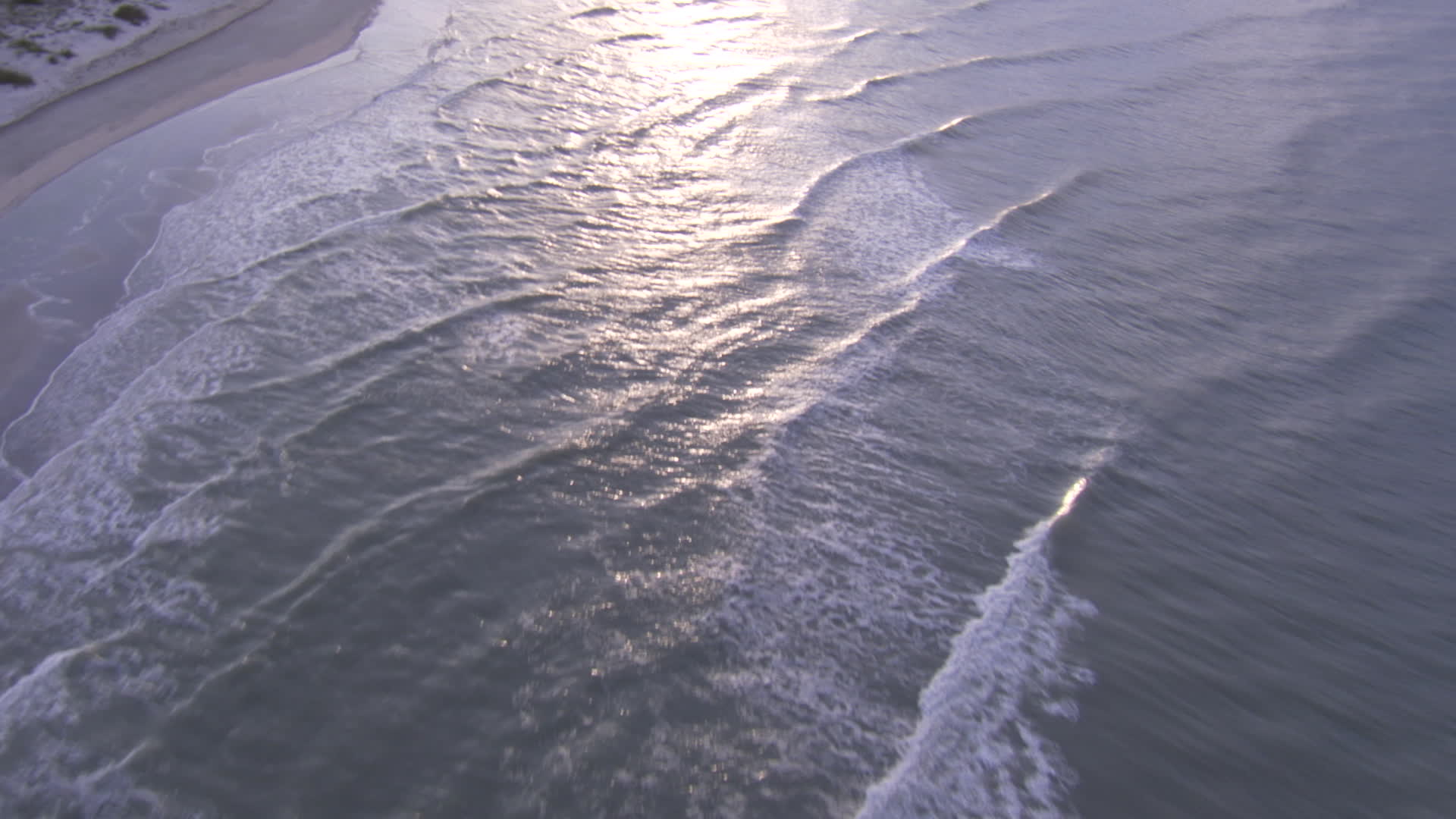 Aerial of beach at sunset 1615261 Stock Video at Vecteezy