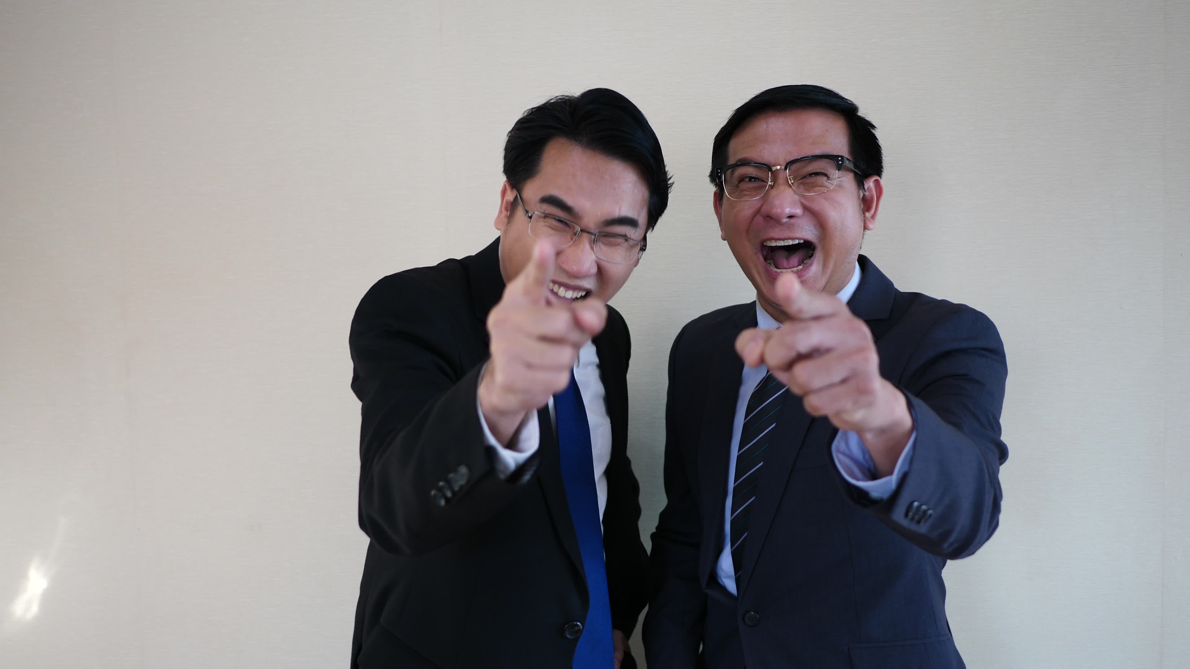 Two businessman laughing. 1792180 Stock Video at Vecteezy