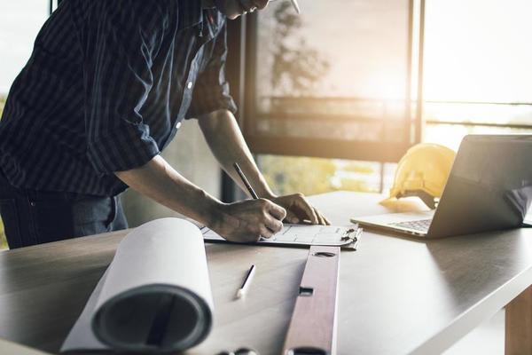 Man Working On Desk Stock Photos, Images and Backgrounds for Free Download