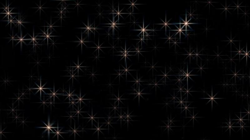 Sparkling Stars On A Black Background 2018554 Stock Video at Vecteezy