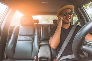 Asian Man Driving Stock Photos, Images and Backgrounds for Free Download