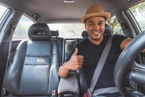 Asian Man Driving Stock Photos, Images and Backgrounds for Free Download