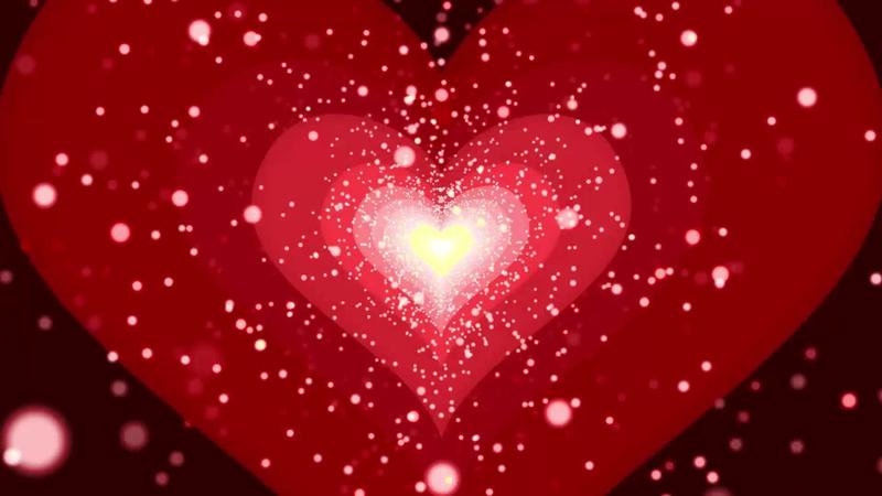 heart particle zoom in loop animation 3662984 Stock Video at Vecteezy