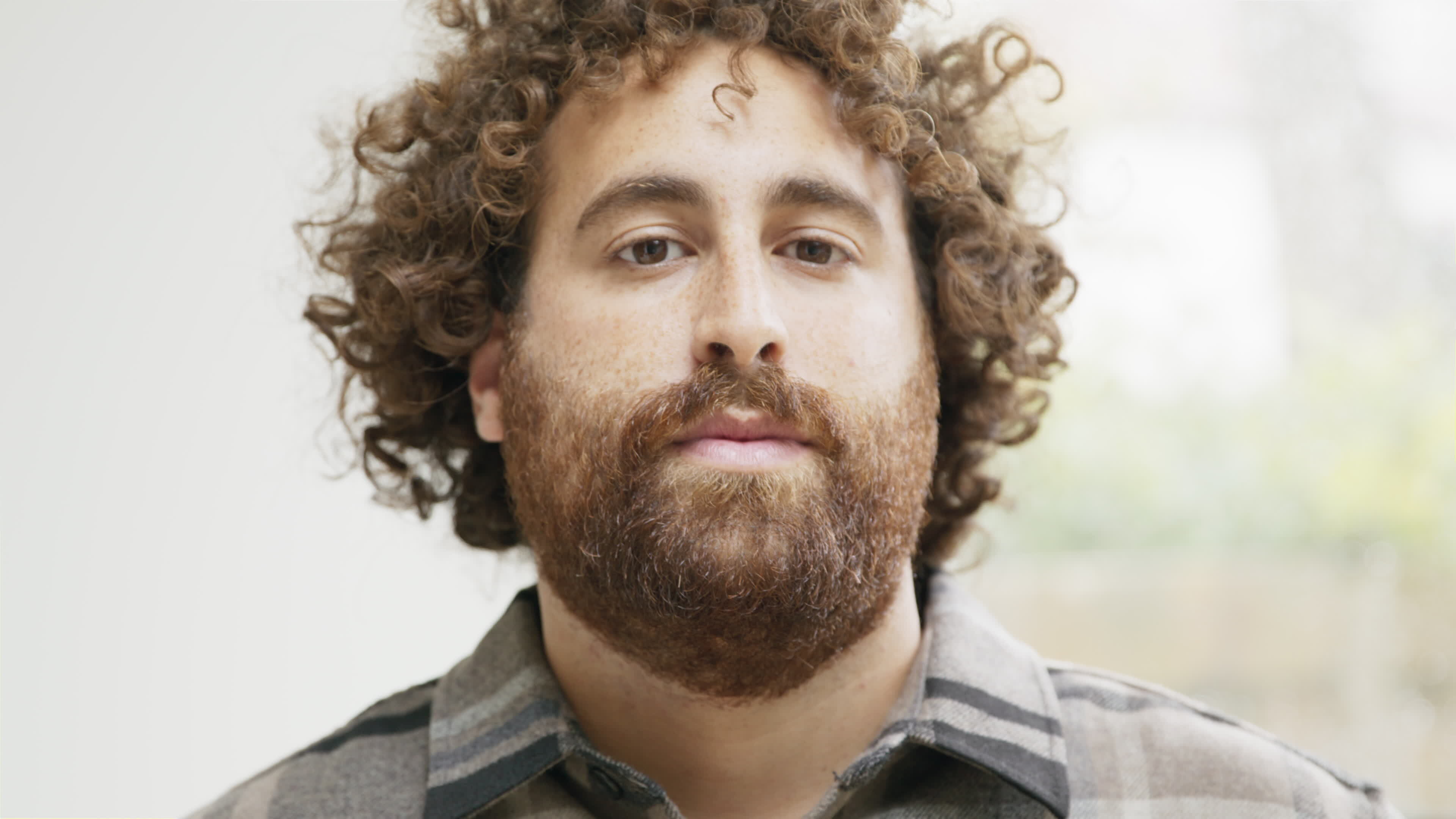 Close up of man looking into camera lens 4254352 Stock Video at Vecteezy