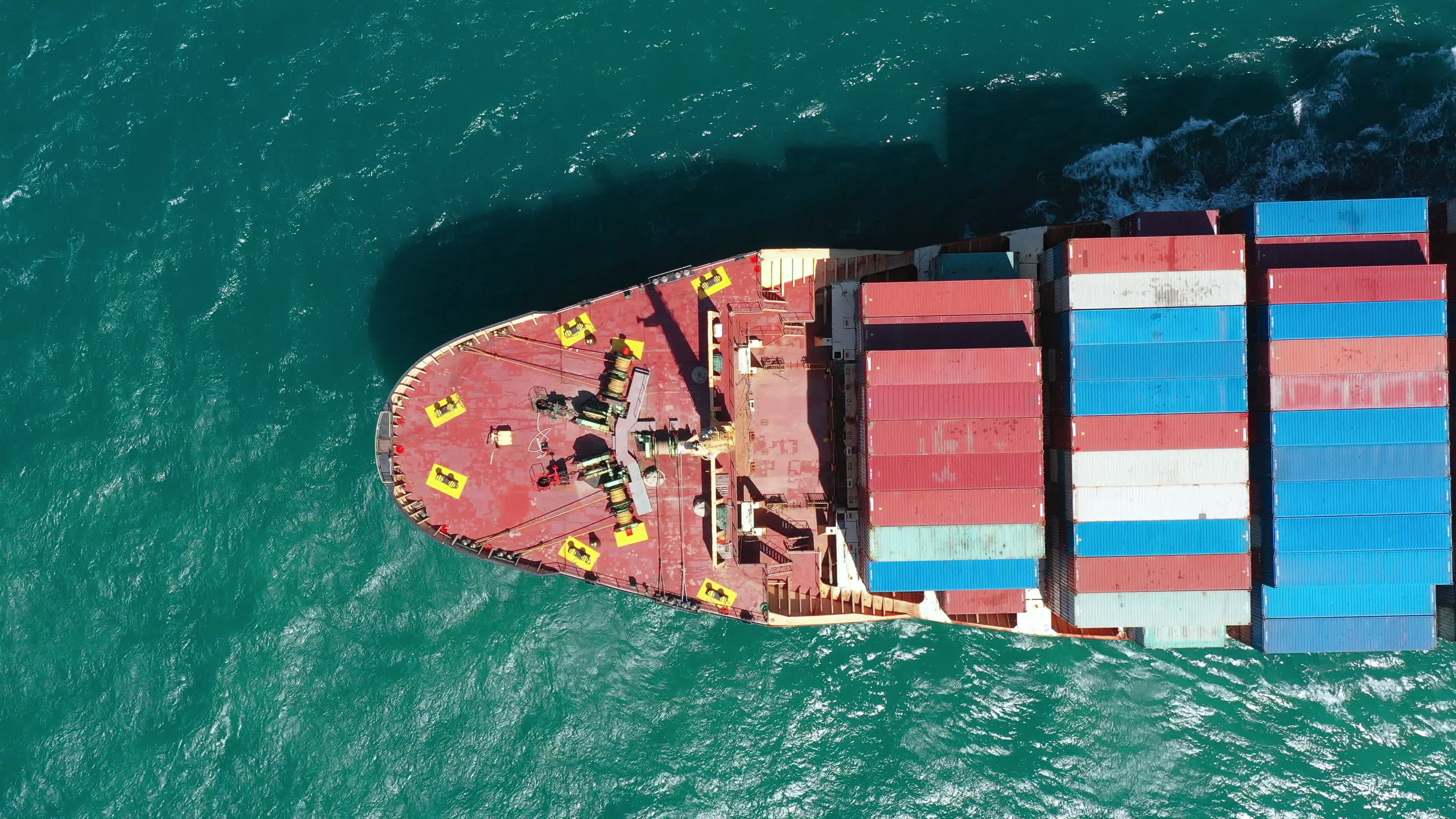 Aerial Top View Of Cargo Maritime Ship With Contrail In The Ocean Ship aerial-top-view-of-cargo-maritime-ship-with-contrail-in-the-ocean-ship