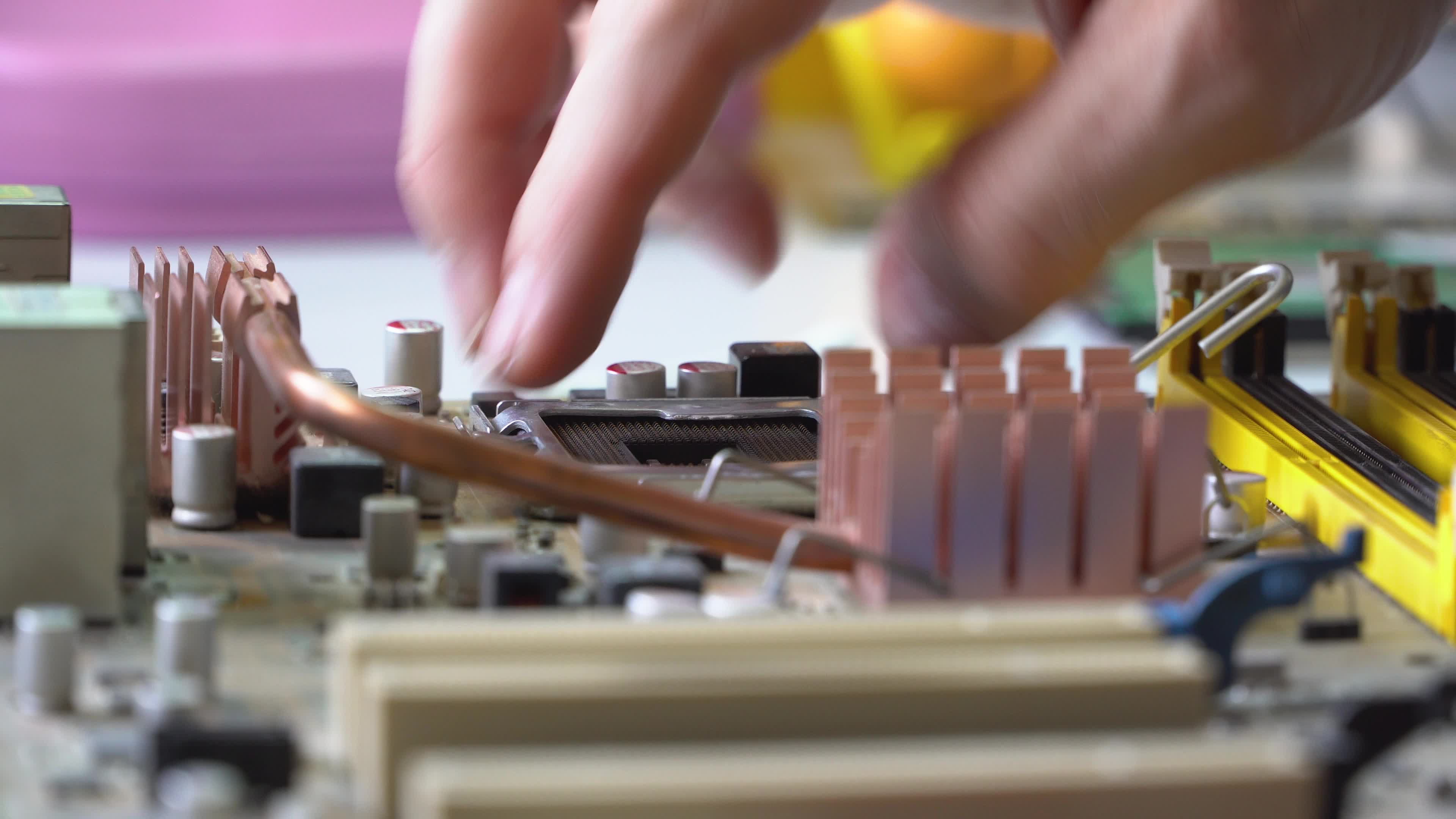 Electronic technician assemble motherboard. PC repair. Install ... Electronic technician assemble motherboard. PC repair. Install ...