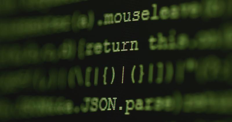 4K Close up shot programming tag code on PC Monitor scroll down. Background concept for ...