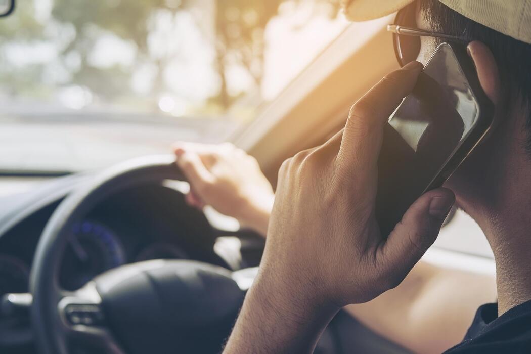 Distracted Driving Stock Photos, Images and Backgrounds for Free Download