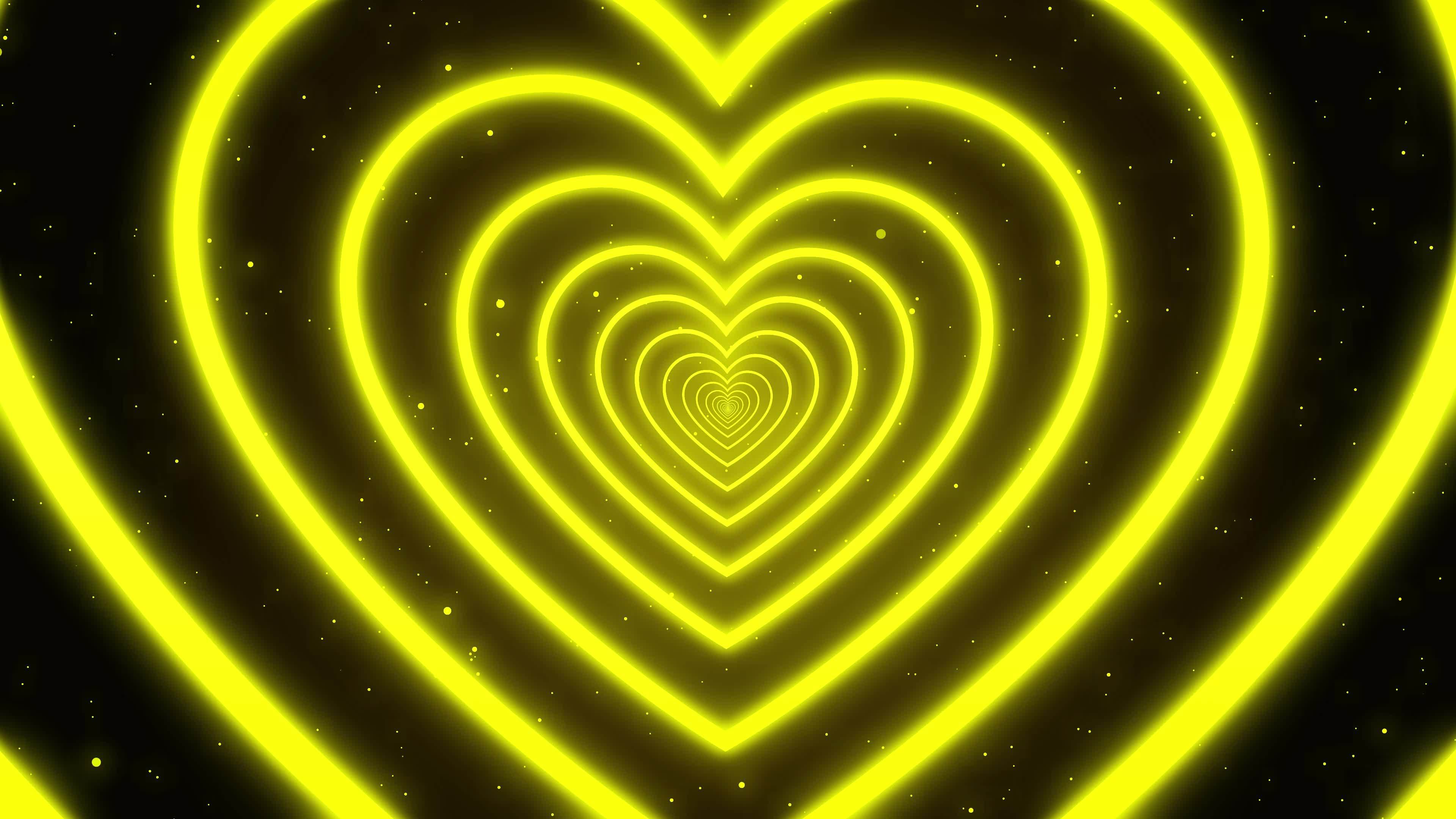 Animation Love Heart Glowing Yellow Color Infinite Looping and Romantic Abstract Glow Particles ...