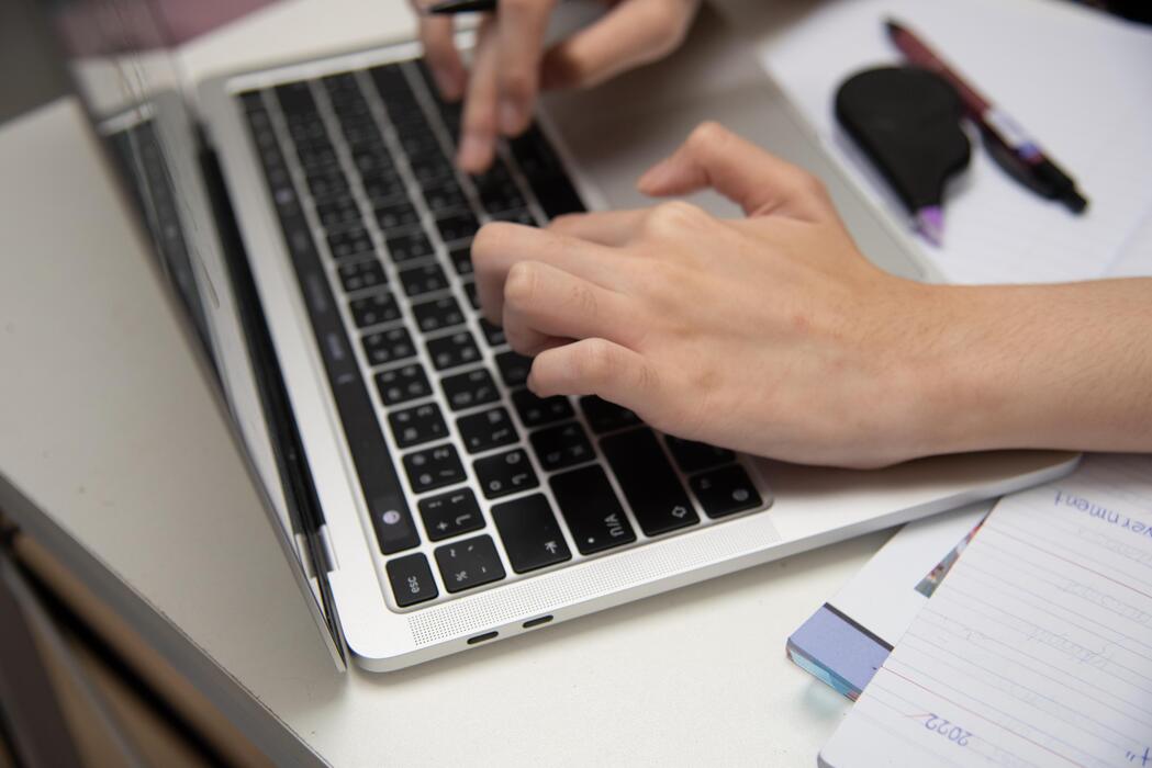 Writing On Laptop Stock Photos, Images and Backgrounds for Free Download