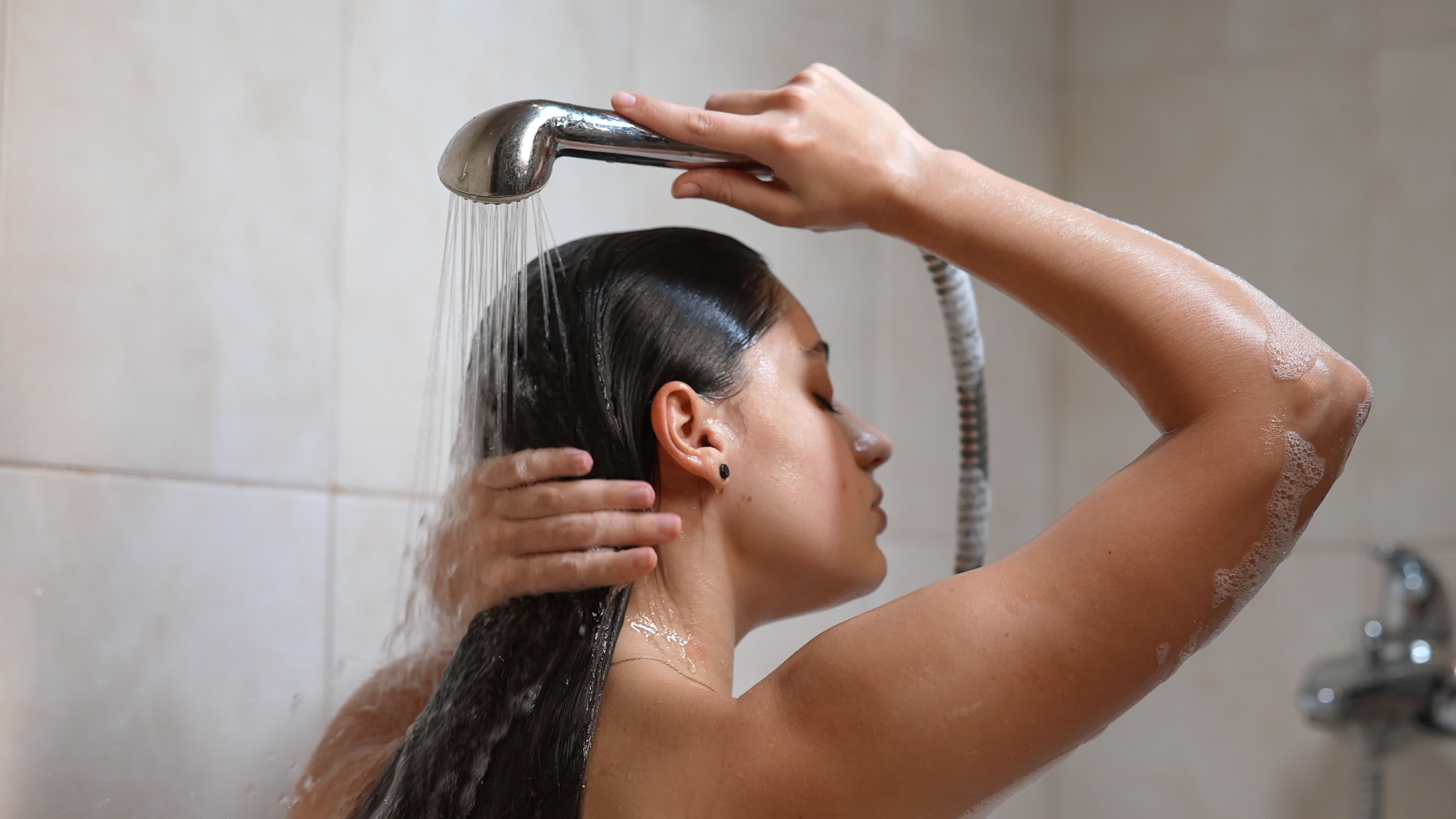 Woman In Shower Rinses Face And Hair In Slow Motion 10939661 Stock Video At Vecteezy