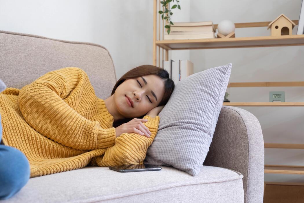 Woman Sleeping On Couch Stock Photos, Images and Backgrounds for Free ...