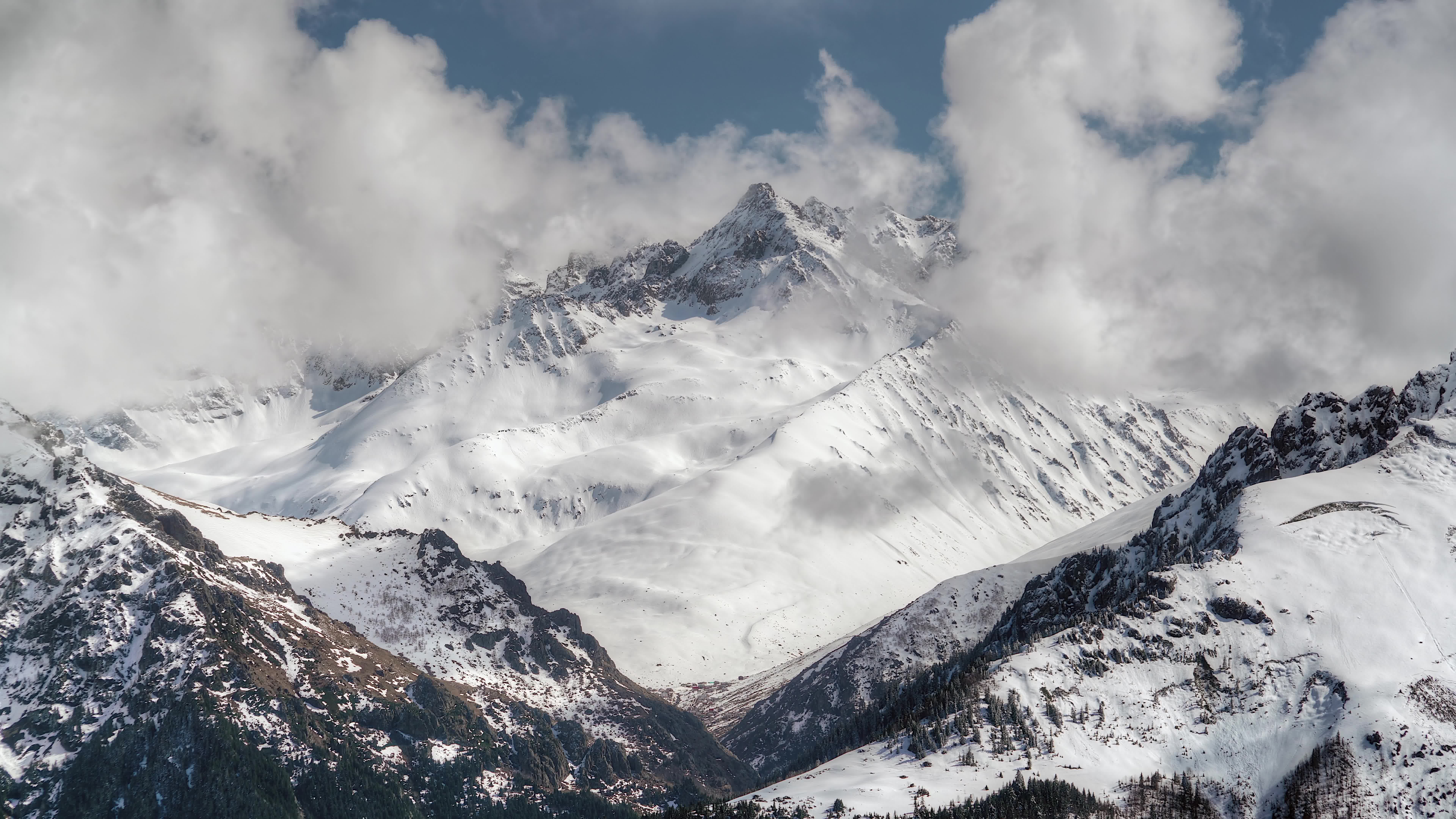 8K Imposing High Snowy Mountain Peaks Behind the Clouds 12262365 Stock ...
